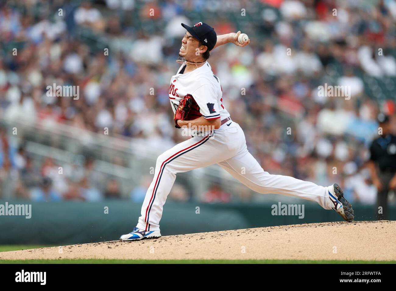 Minnesota Twins starting pitcher Kenta Maeda (18) throws a pitch in the ...