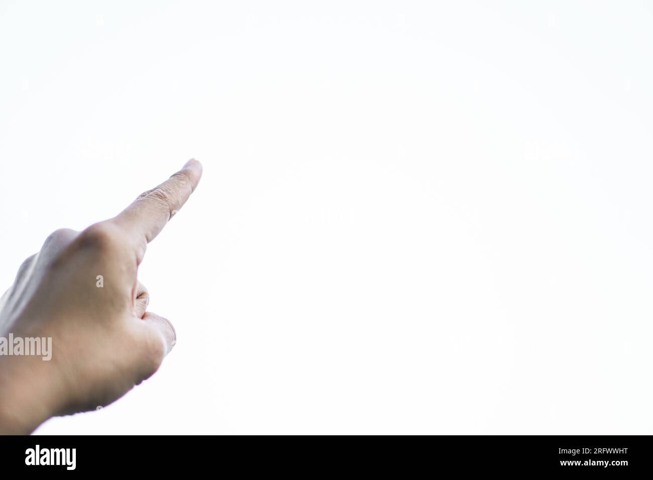 A hand signs gesture to be little heart from tip of thumb and index ...