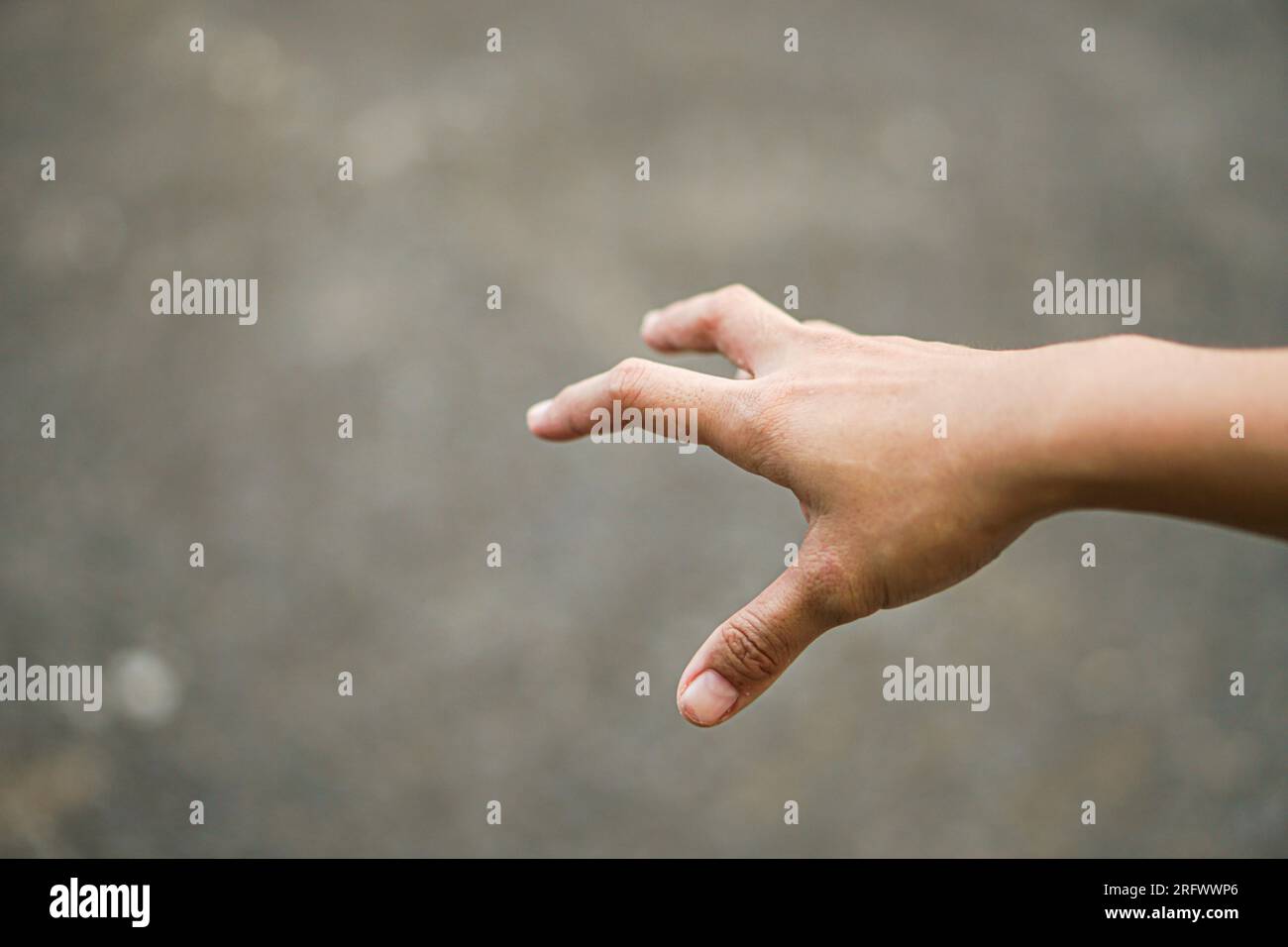 A hand signs gesture to be little heart from tip of thumb and index ...
