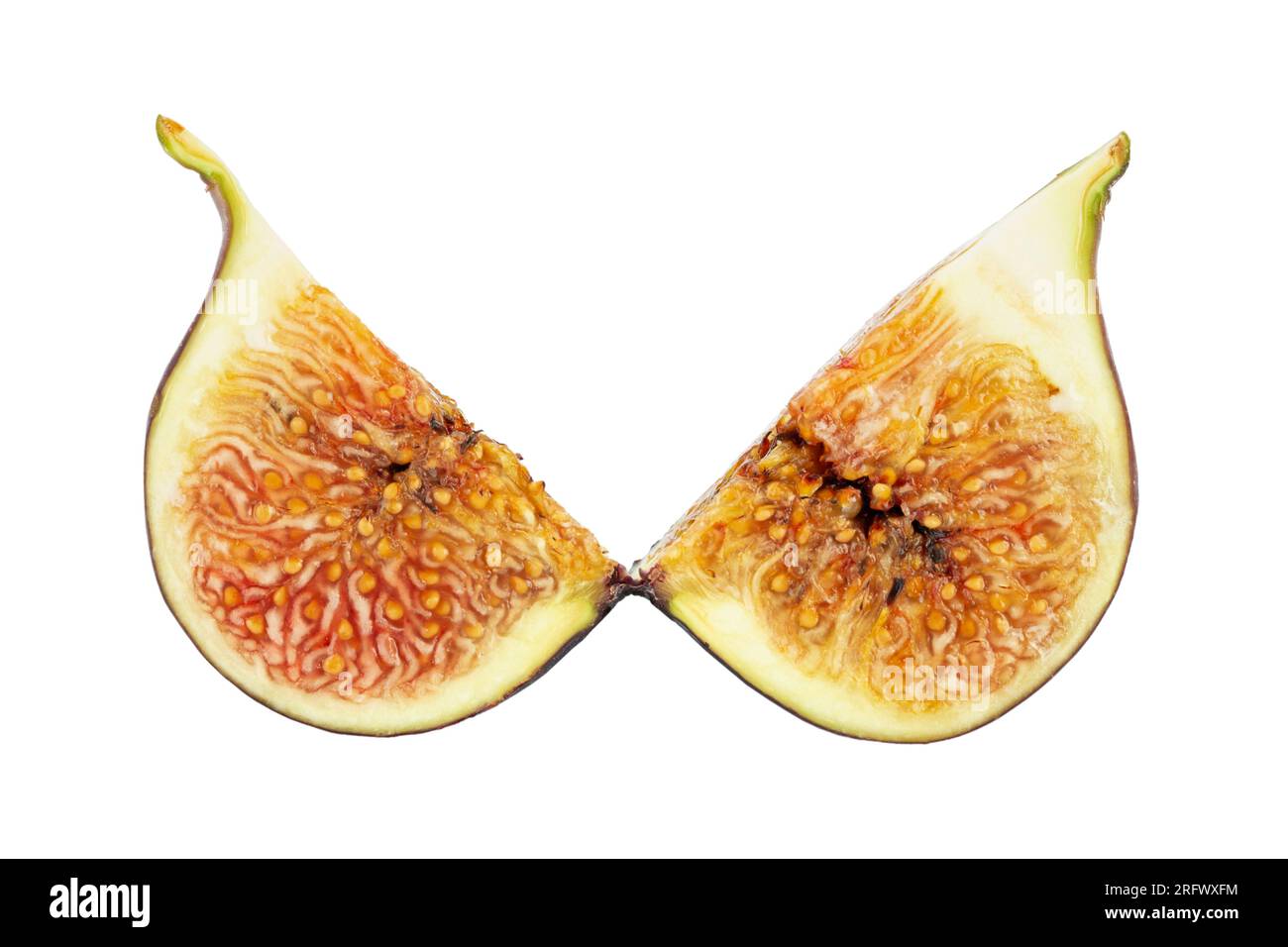 Ripe figs cut in half. Isolated on white background. File contains ...