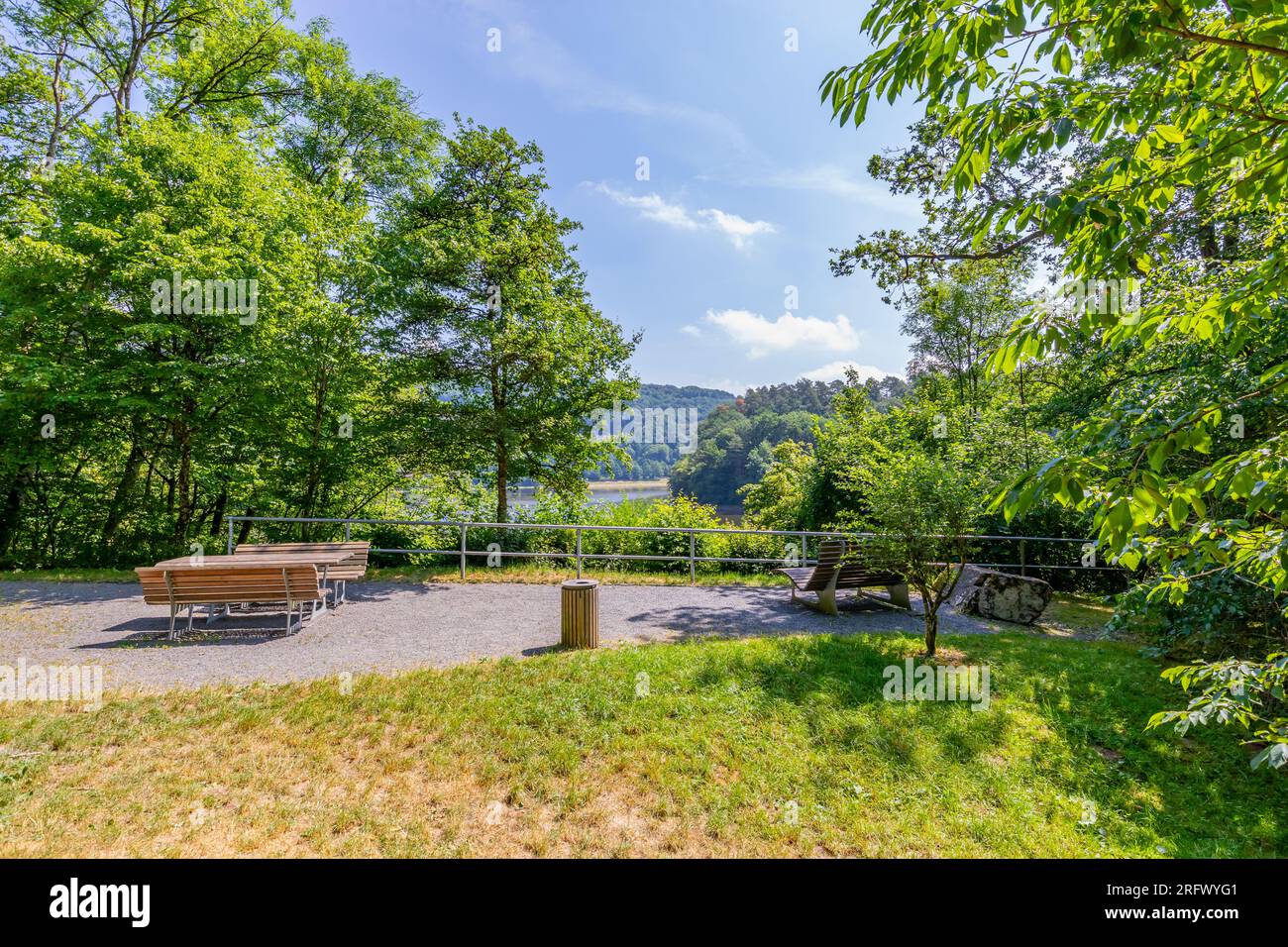 Panoramic viewpoint surrounded by abundant green vegetation and leafy ...