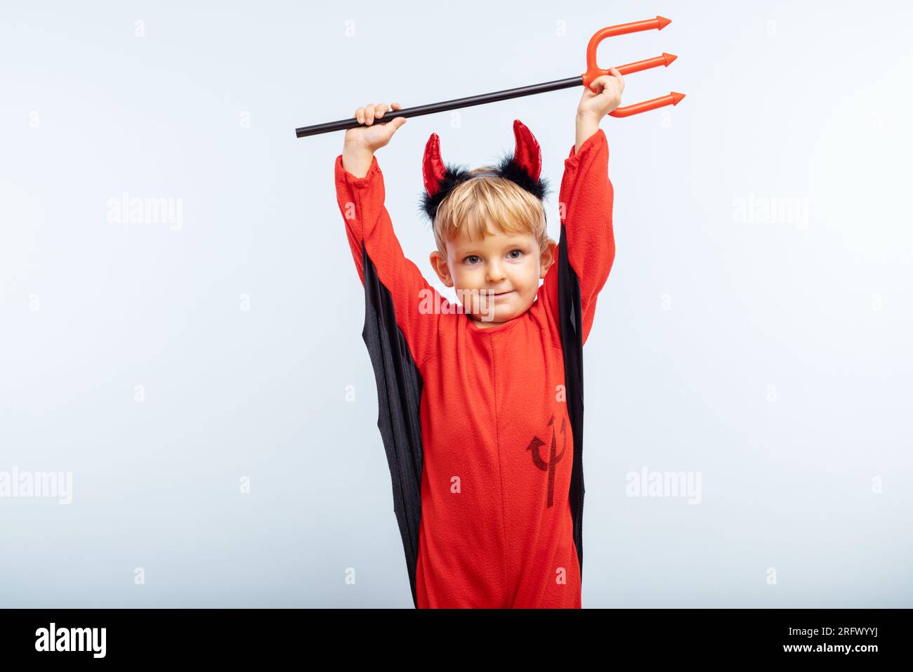 Child boy devil horns trident hi-res stock photography and images - Alamy
