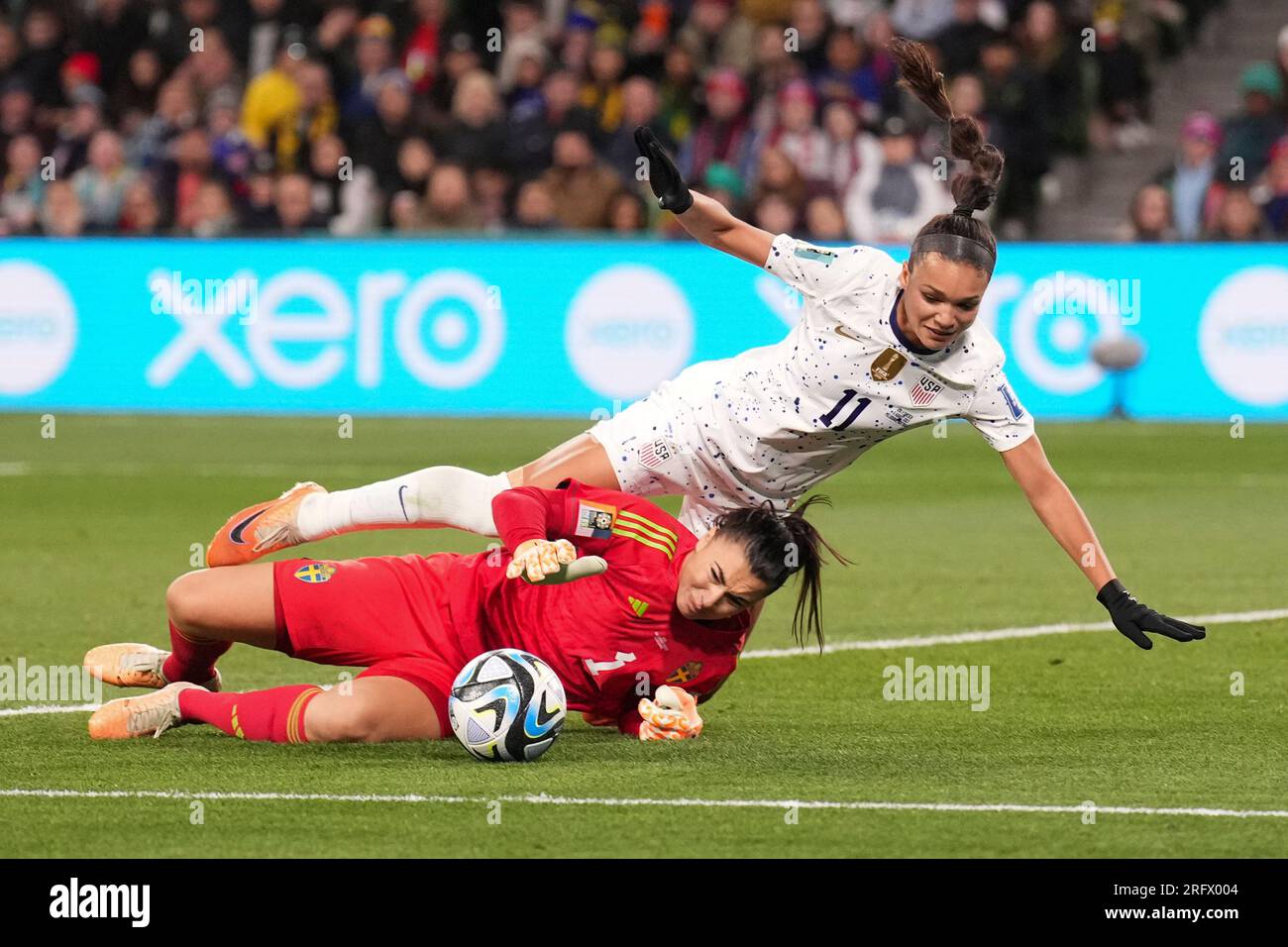 United States' Sophia Smith, top, and Sweden's goalkeeper Zecira ...