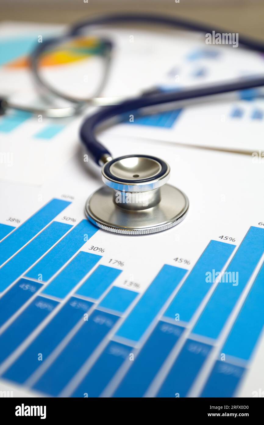 Stethoscope on chart graph. The concept of medical statistics and ...