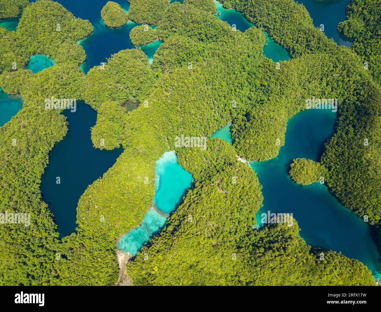 Beautiful sea water lagoons and mountain hills. Seascape. Bucas Grande ...