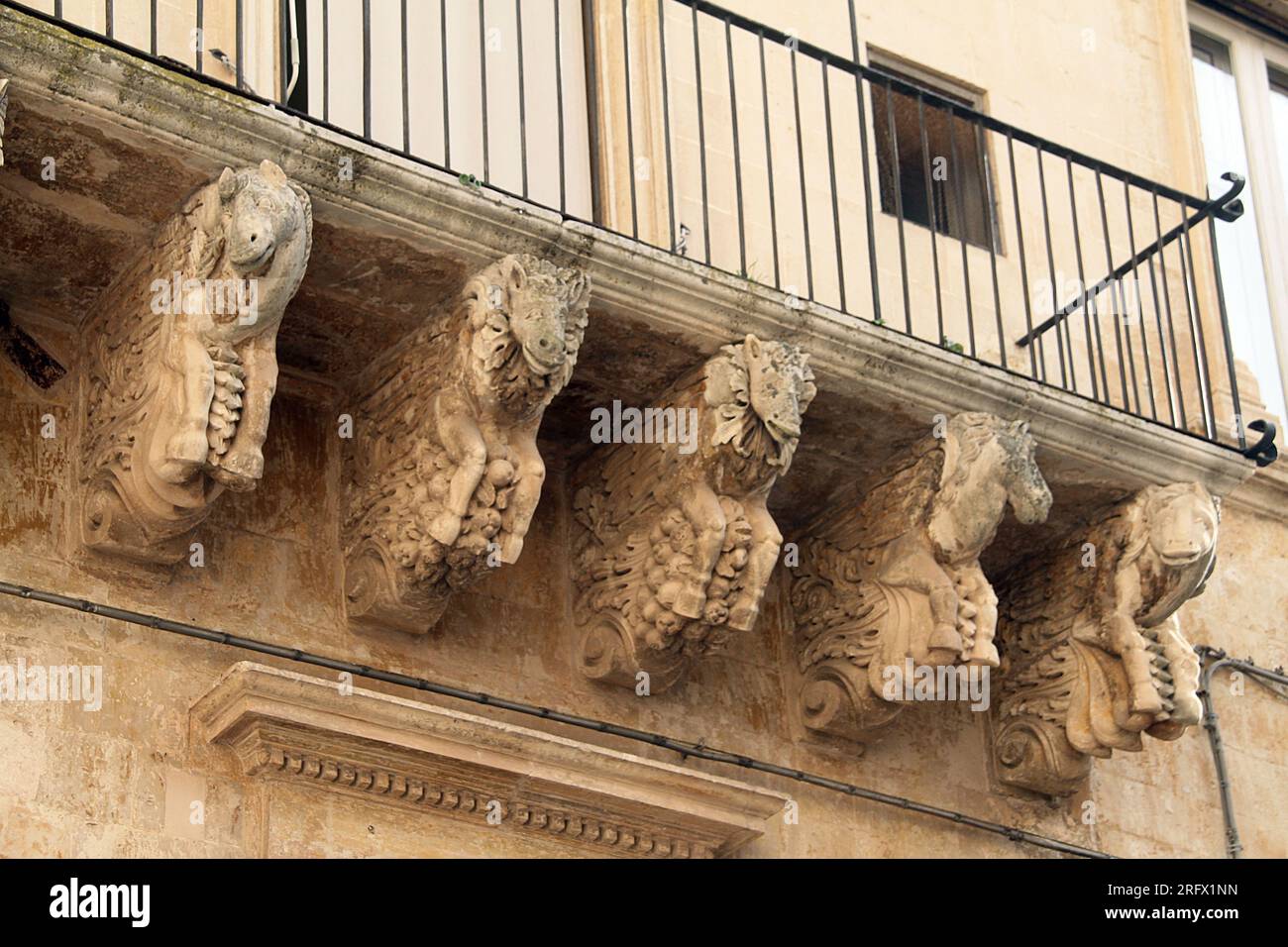 Lecce, Italy. Decorative corbels supporting the balcony in the ...
