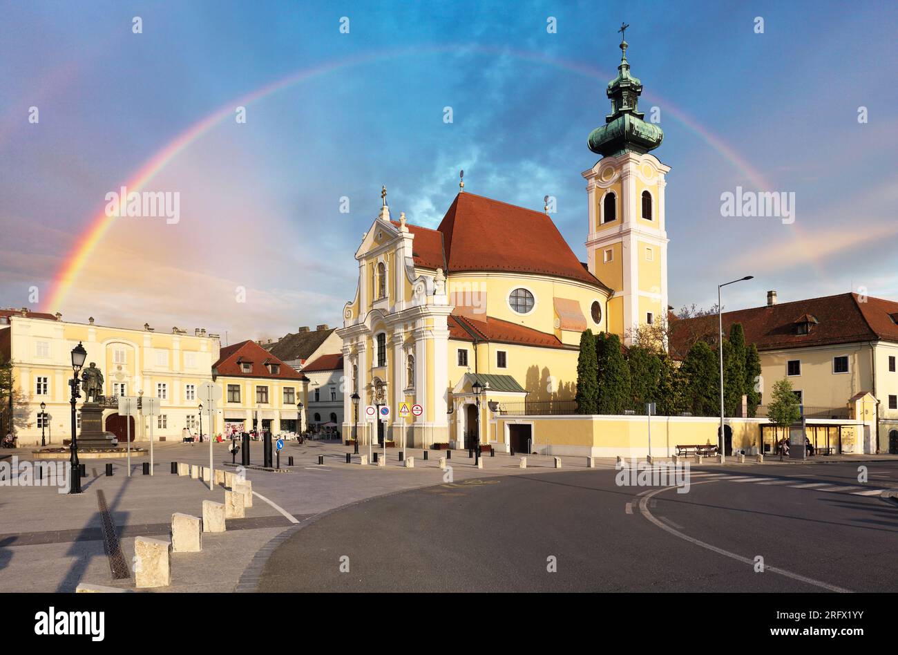 Hungary city Gyor, Carmelite Church with rainbow Stock Photo - Alamy