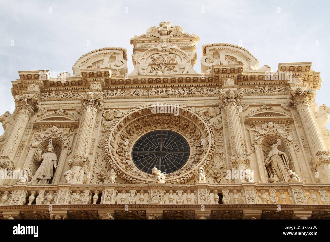 Lecce, Italy. Exterior view of the 16th century Church of the Holy ...