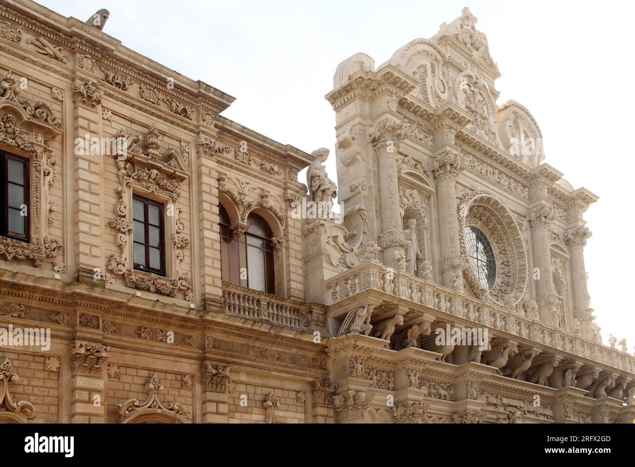Lecce, Italy. Facade of the 16th century Church of the Holy Cross and ...