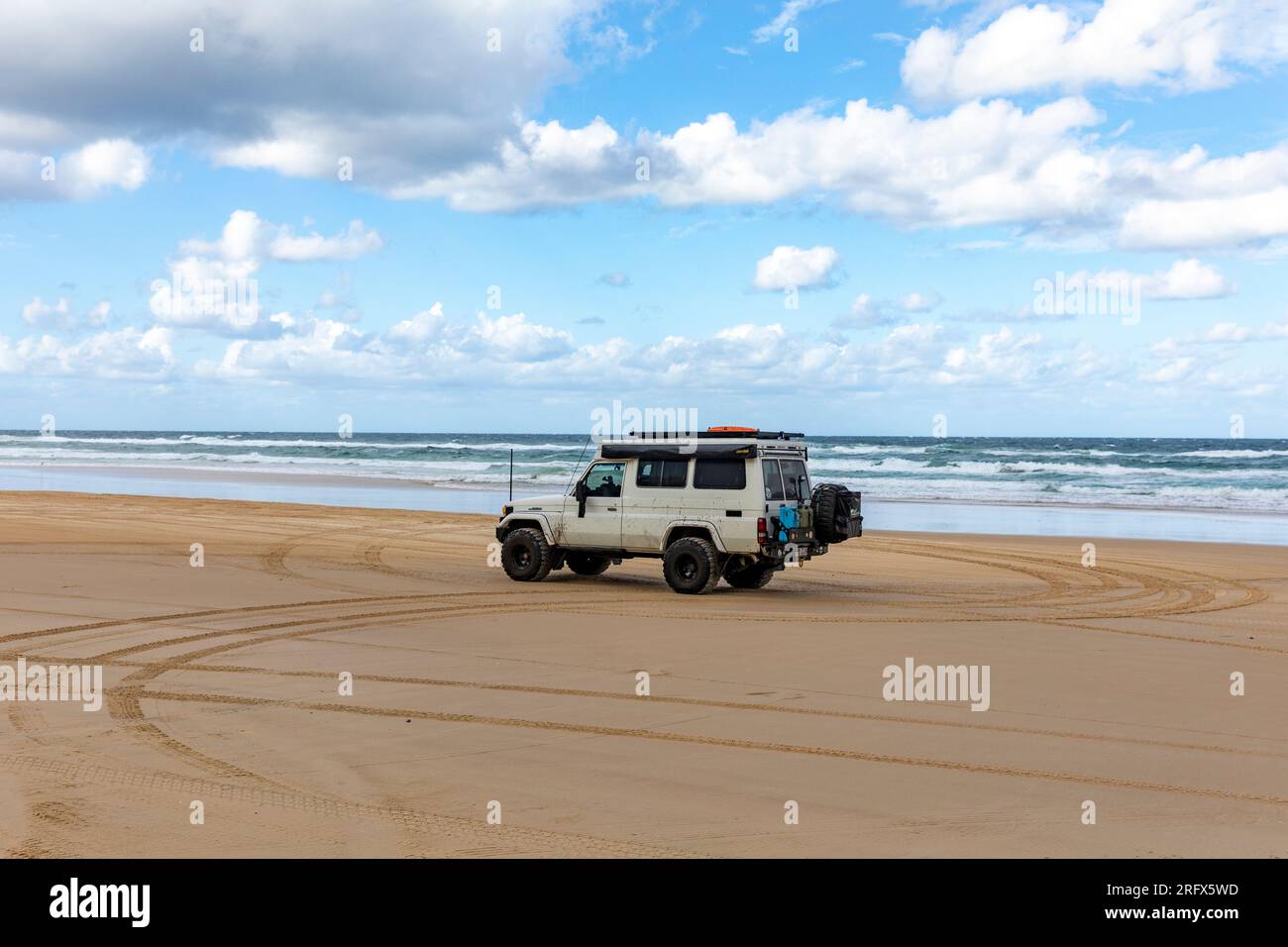75 mile beach Fraser K'gari Island, 4WD Toyota land cruiser driving ...