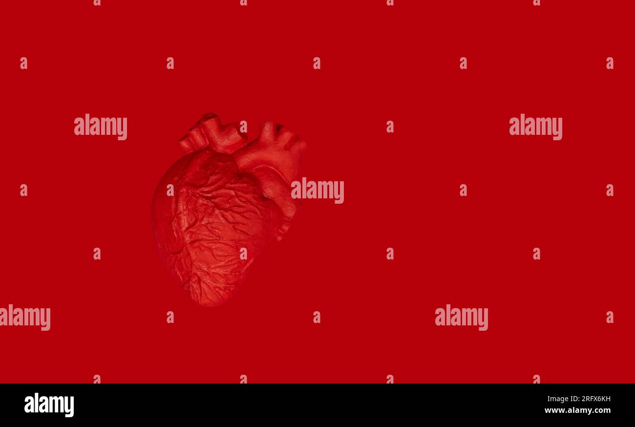 Red heart on red background. World heart day, world health day, doctor ...