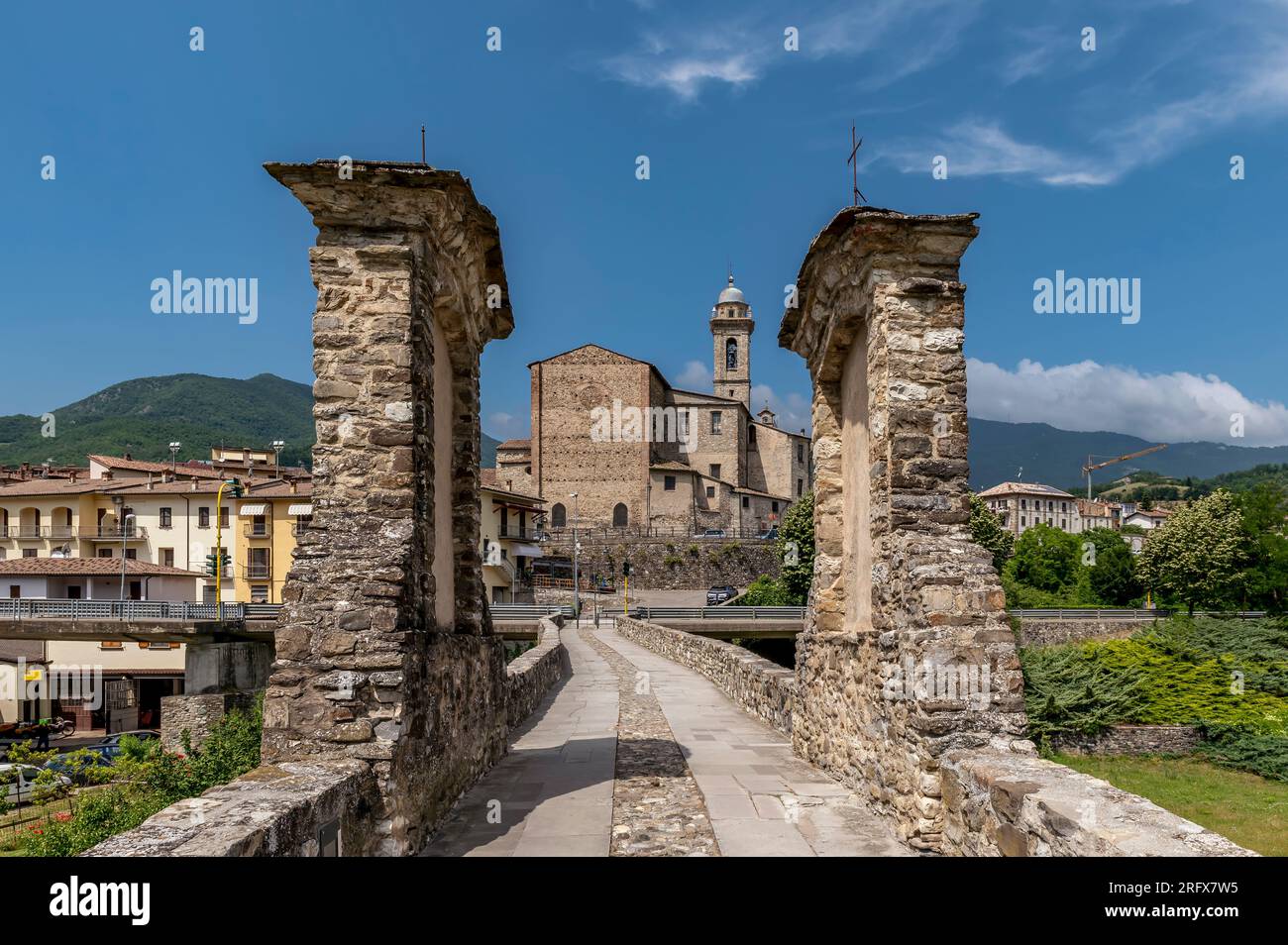 A glimpse of Bobbio, Italy, framed by the ancient hunchback bridge ...