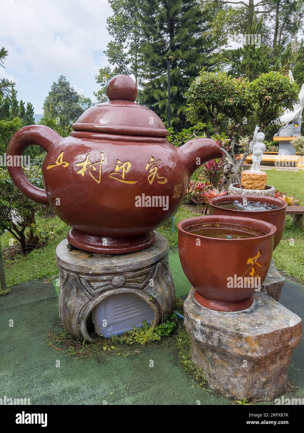 Big teapot at a garden, Betong Stock Photo - Alamy