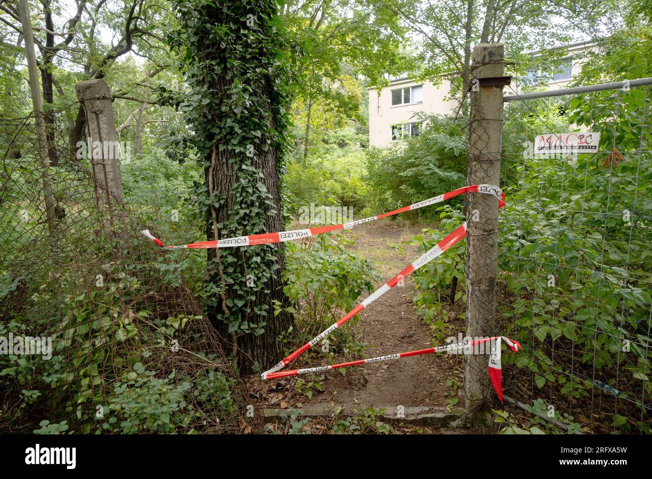 Potsdam, Germany. 06th Aug, 2023. A destroyed fence of the property was ...