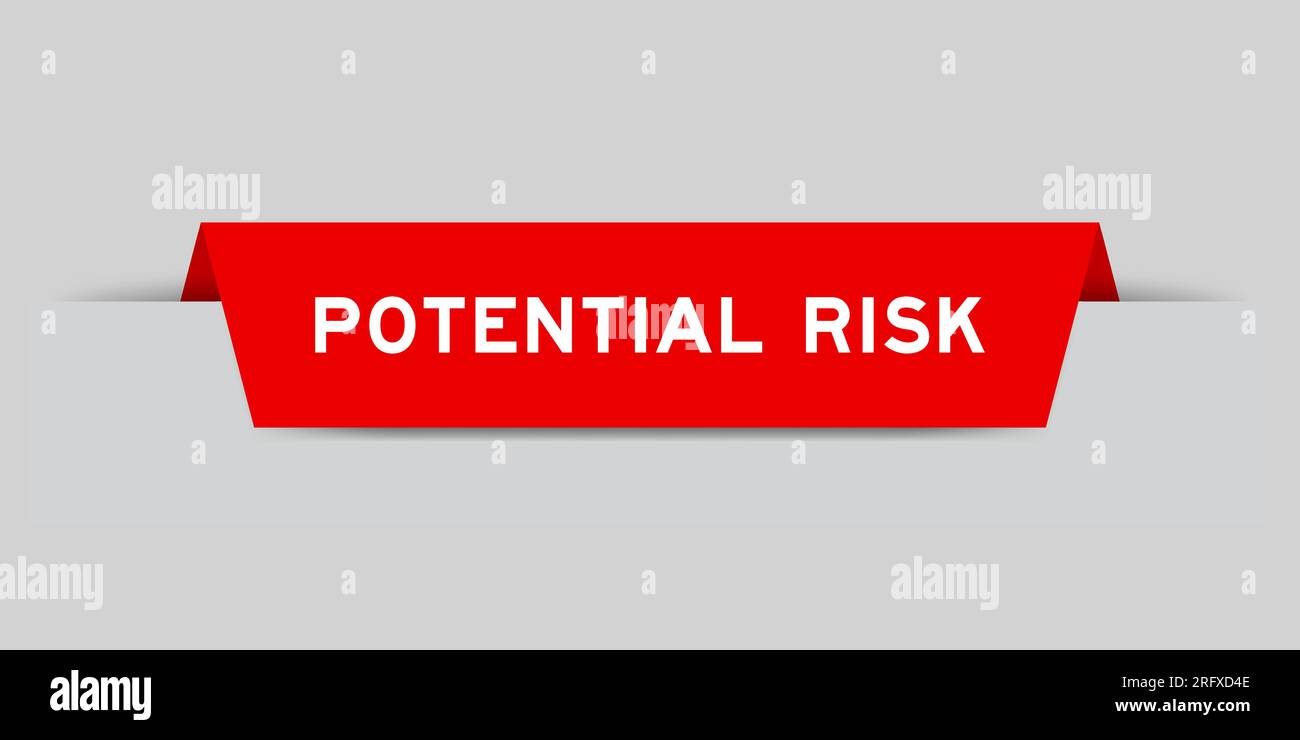 Red color inserted label with word potential risk on gray background ...