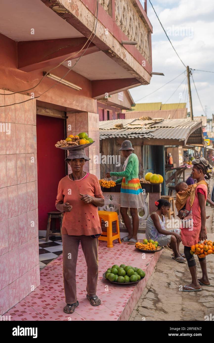 Ambodinifody, Madagascar - May 24.2023: Malagasy woman carry food on ...