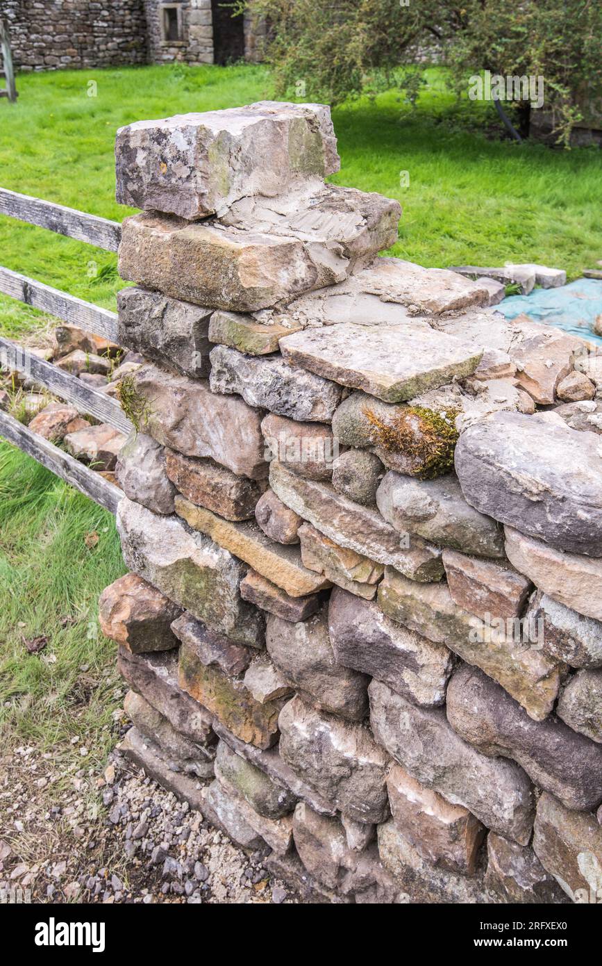 Restoration & rebuild of a stone wall in Long Preston adjacent to ...