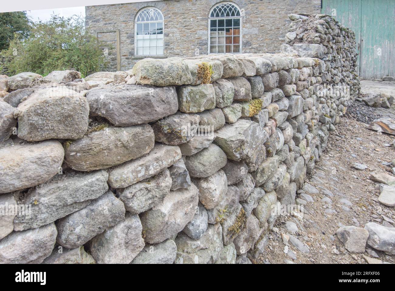 Restoration & rebuild of a stone wall in Long Preston adjacent to ...