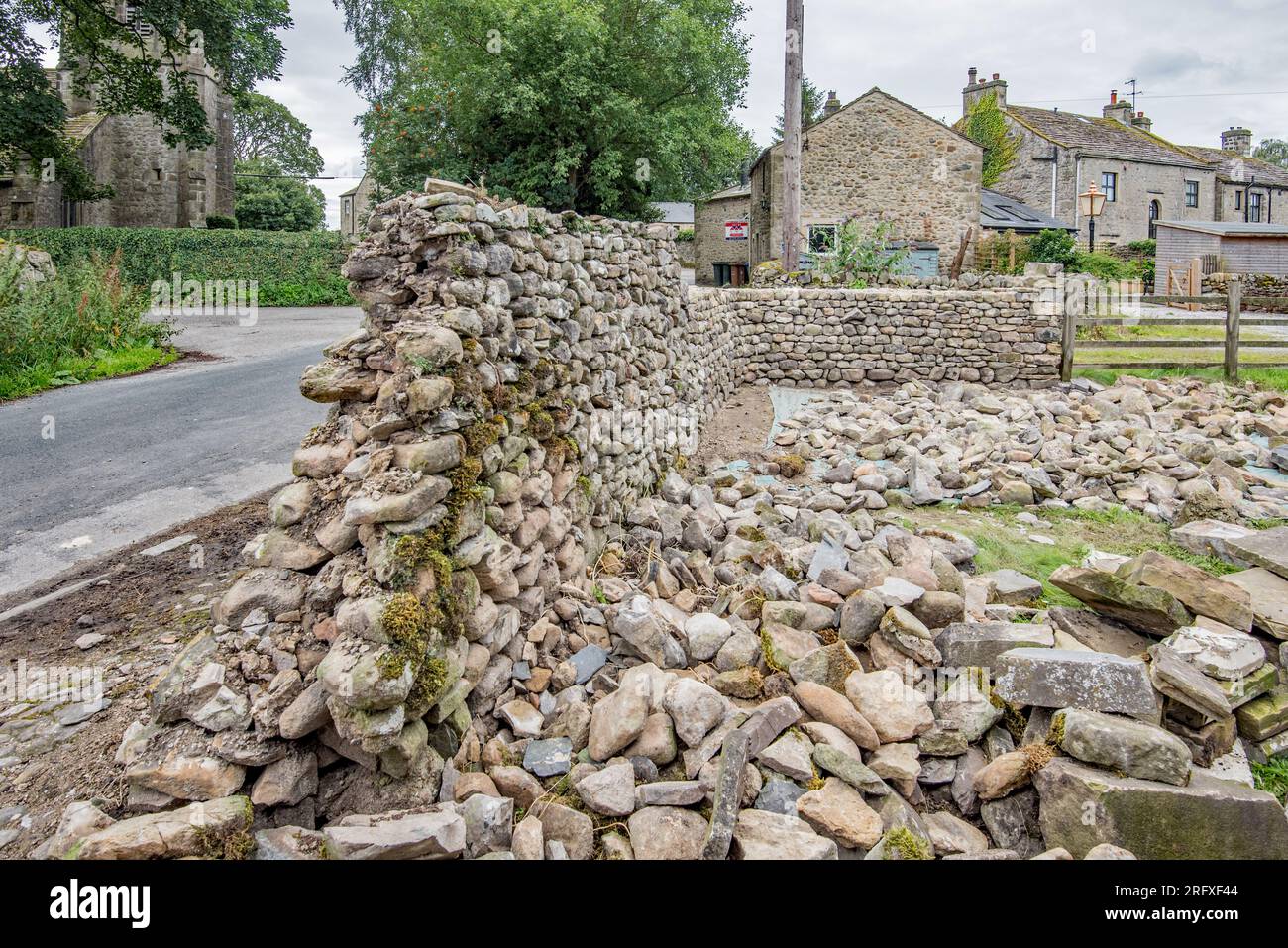 Restoration & rebuild of a stone wall in Long Preston adjacent to ...