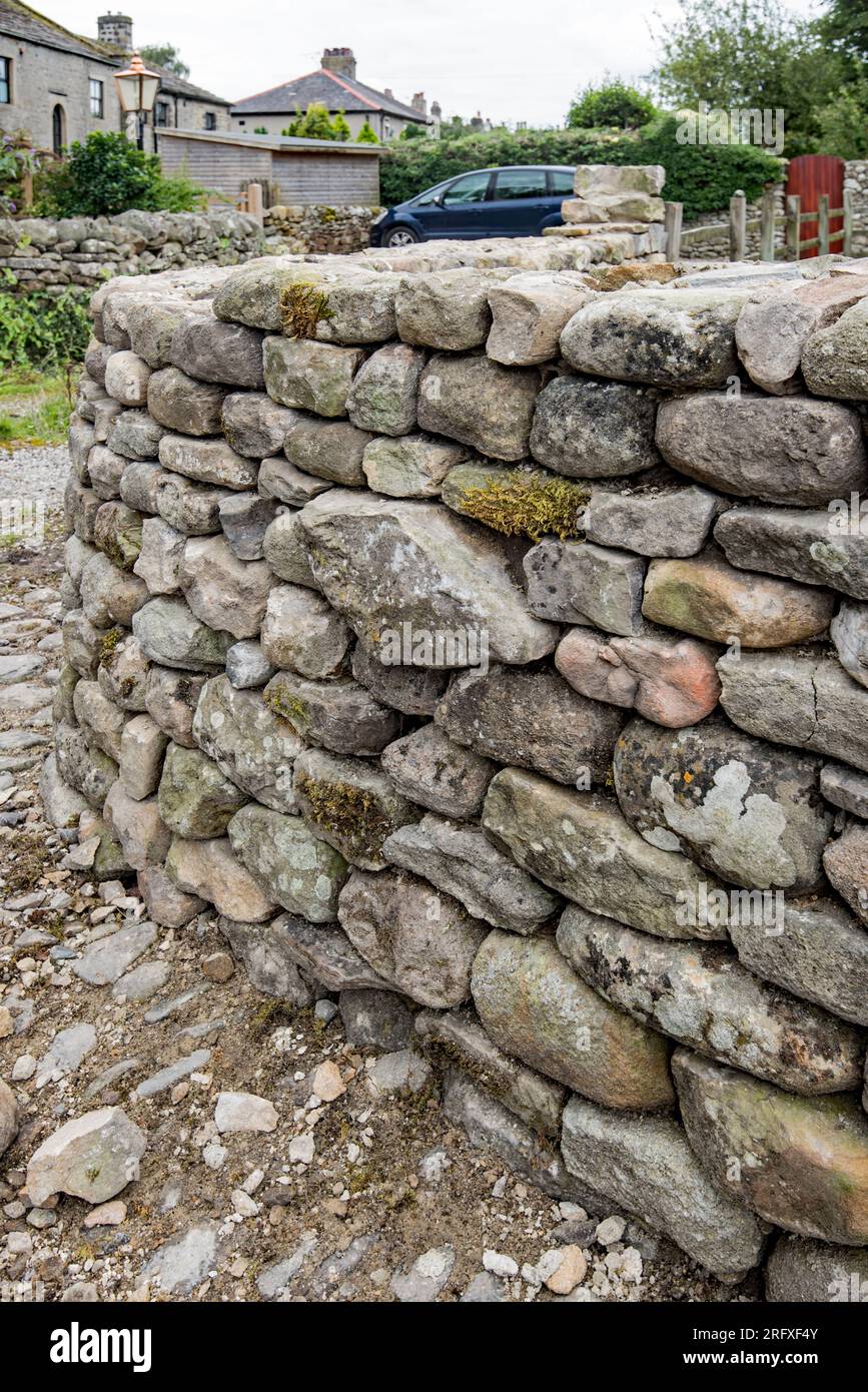 Restoration & rebuild of a stone wall in Long Preston adjacent to ...