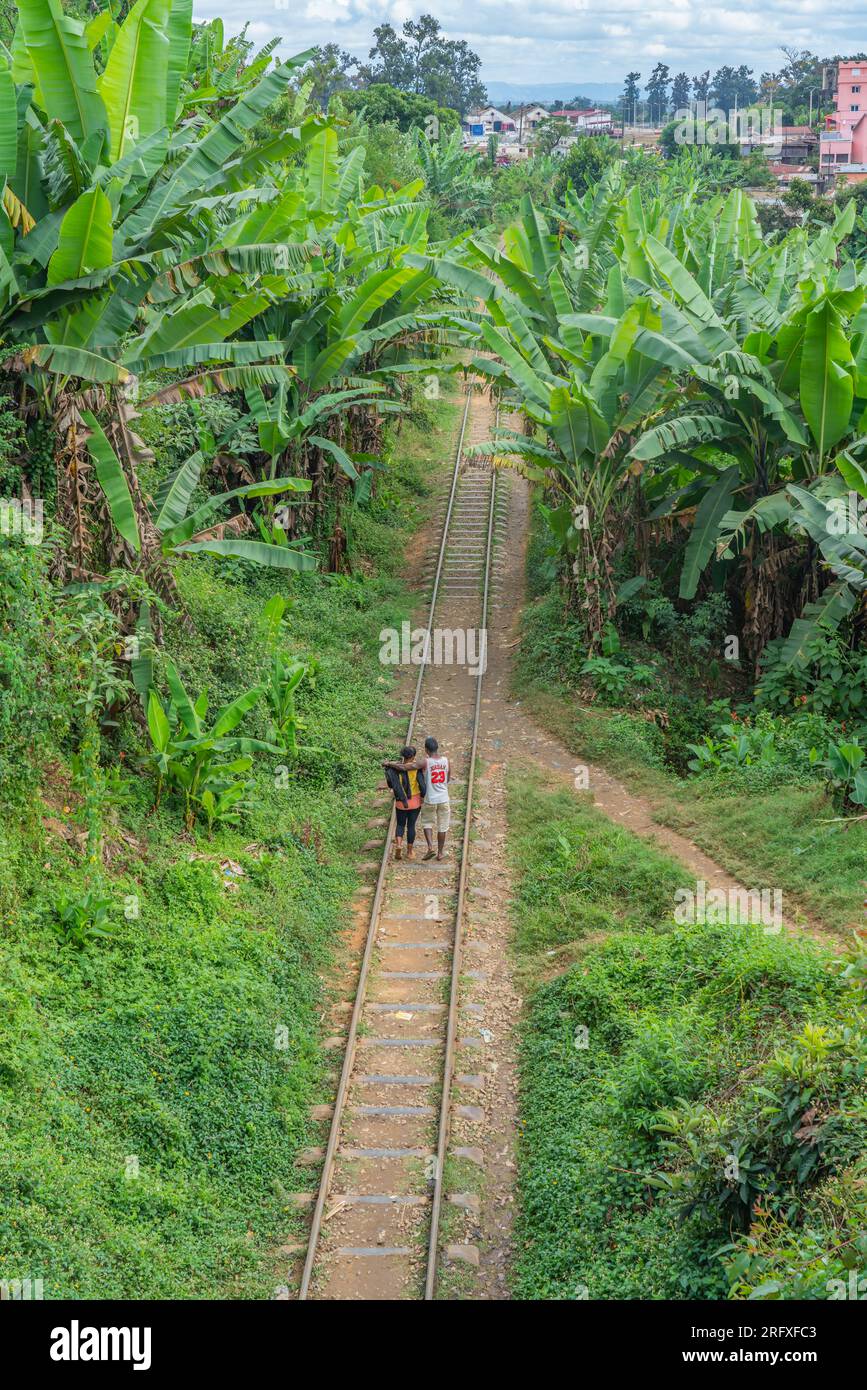Panoramic view of Madagascar landscape with a couple at the trainline ...