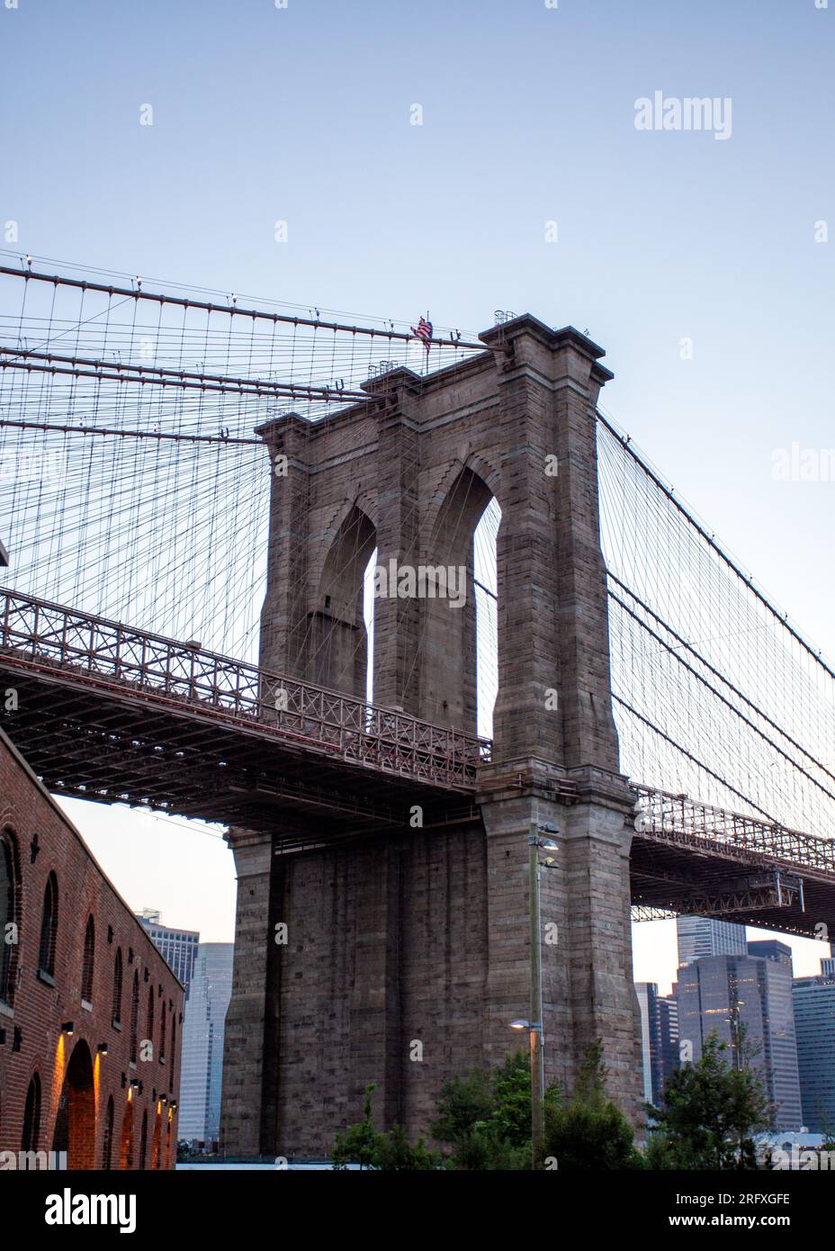 Capture the majestic allure of the Brooklyn Bridge, an architectural ...