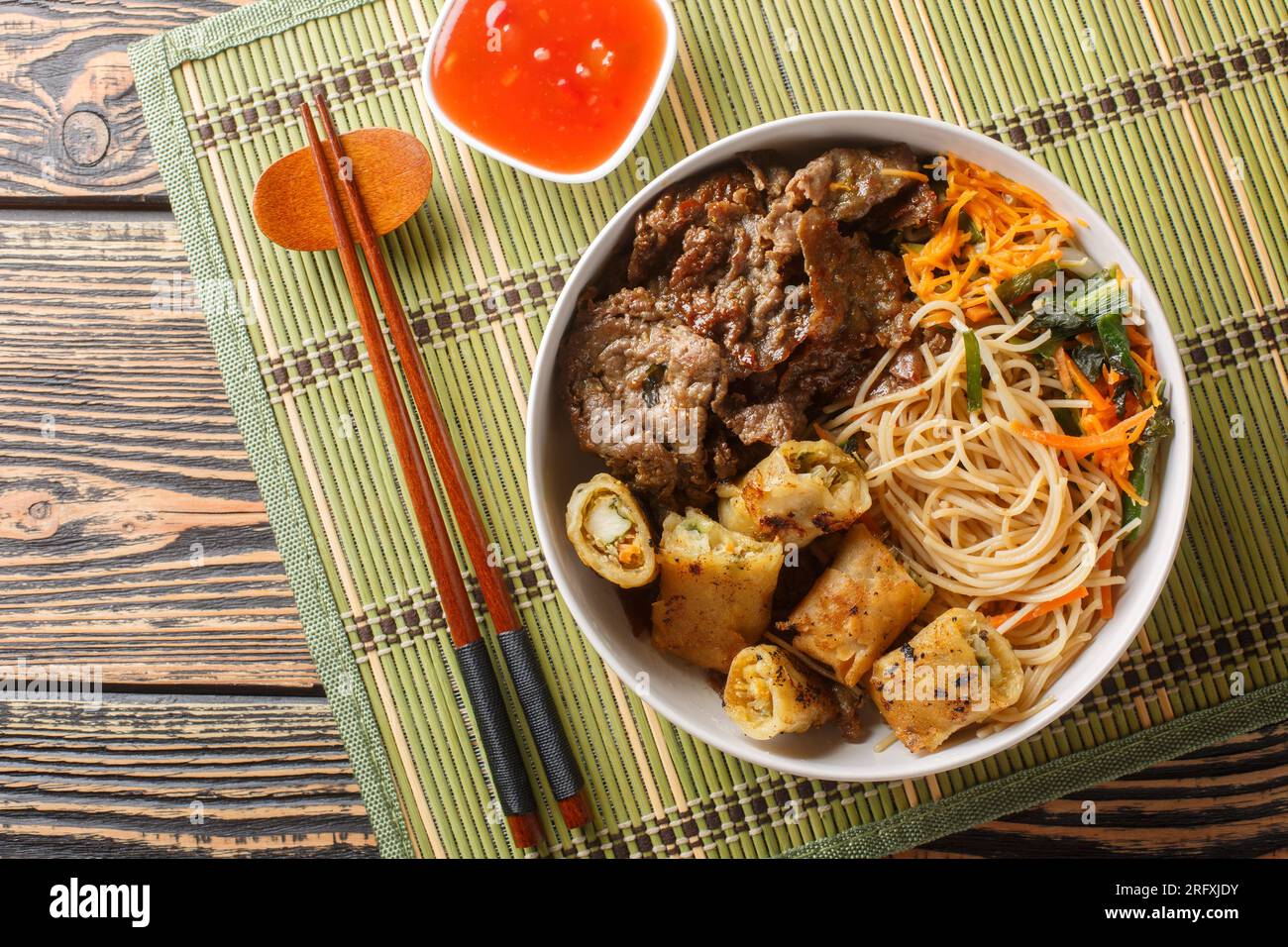 Bun Bo Xao is a Vietnamese noodle salad made with marinated flank steak ...