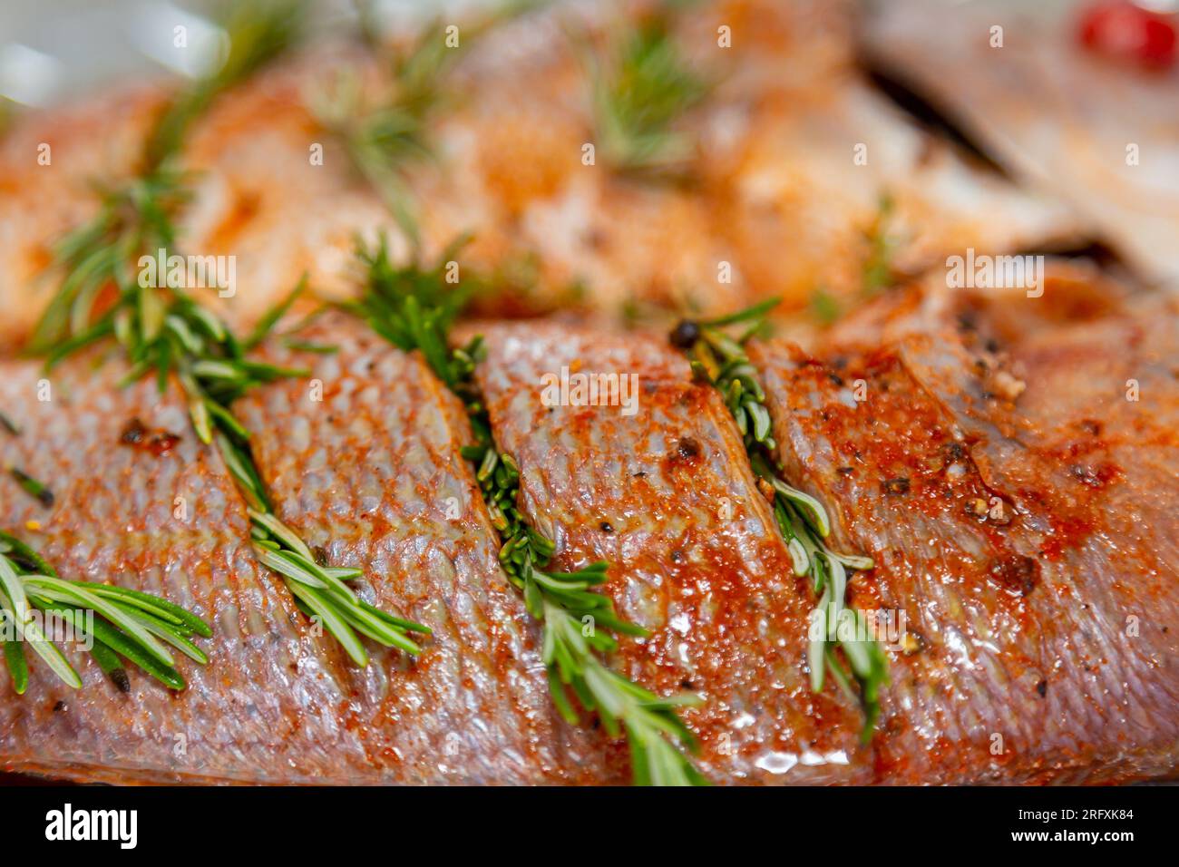 Traditional roast snapper fish with rosemary and sautéed potatoes Stock ...