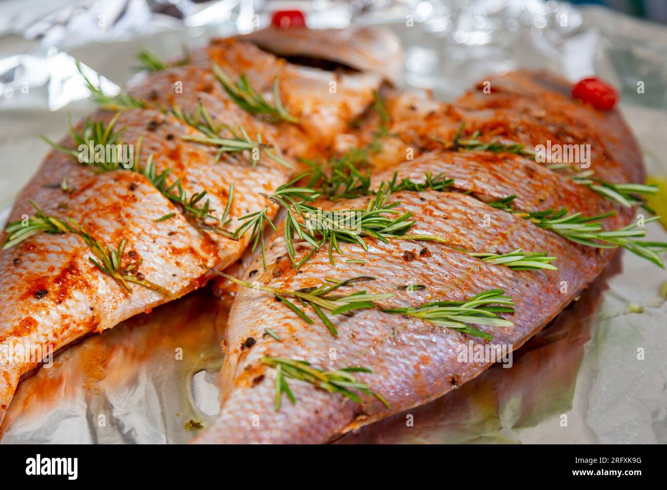 Traditional roast snapper fish with rosemary and sautéed potatoes Stock ...