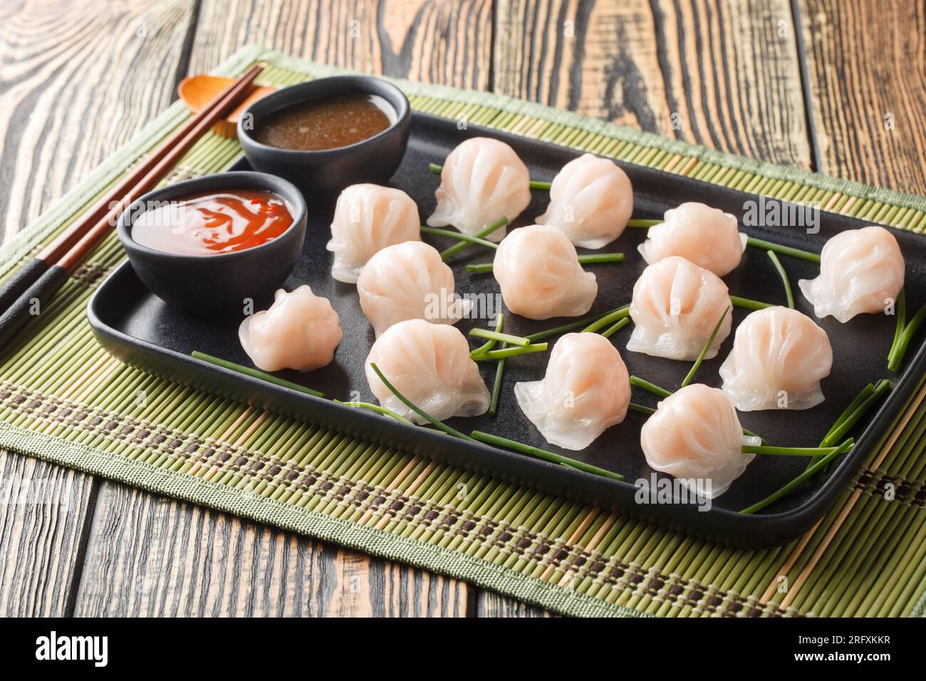 Har gow is a traditional Cantonese dumpling stuffed with shrimp closeup ...