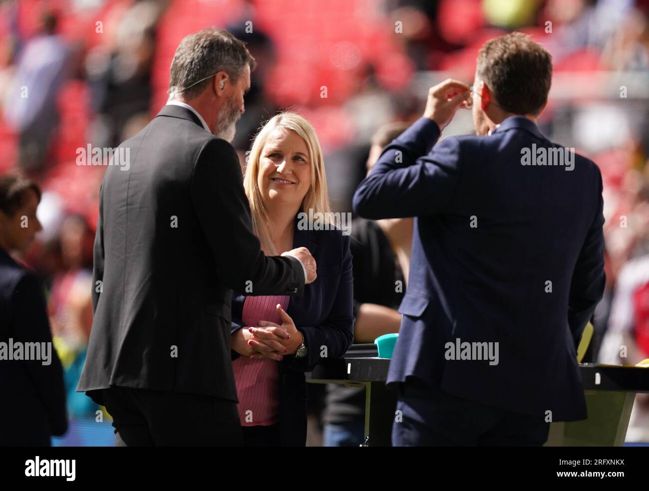 Chelsea manager Emma Hayes speaks to Roy Keane (left) before the FA ...