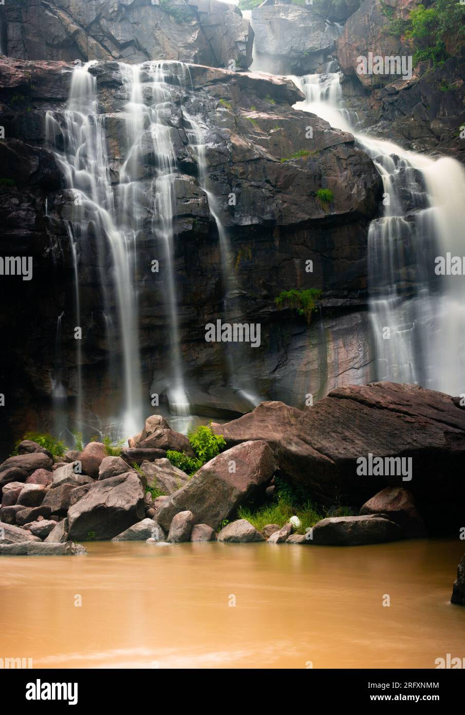Silky milky smooth waterfall flowing over rocks at Hundru Ranchi ...