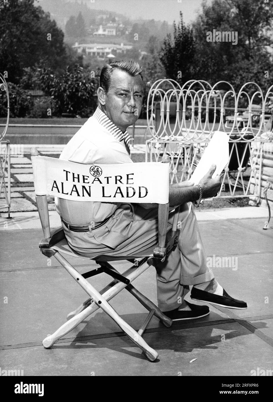 ALAN LADD at home next to his swimming pool in 1954 publicity for his ...