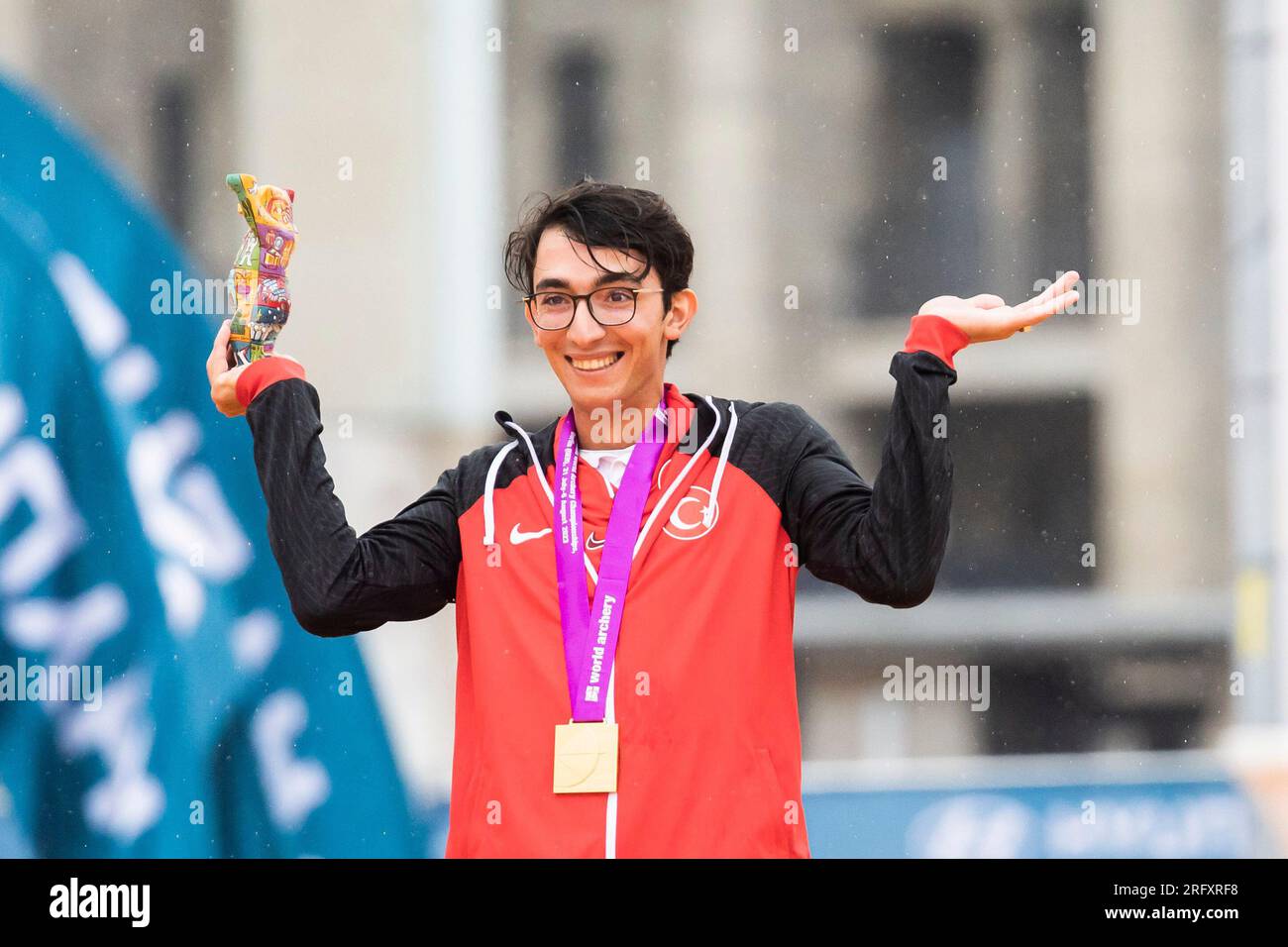 Gold medalist Mete Gazoz from Turkey reacts during the award ceremony for the men's Olympic ...