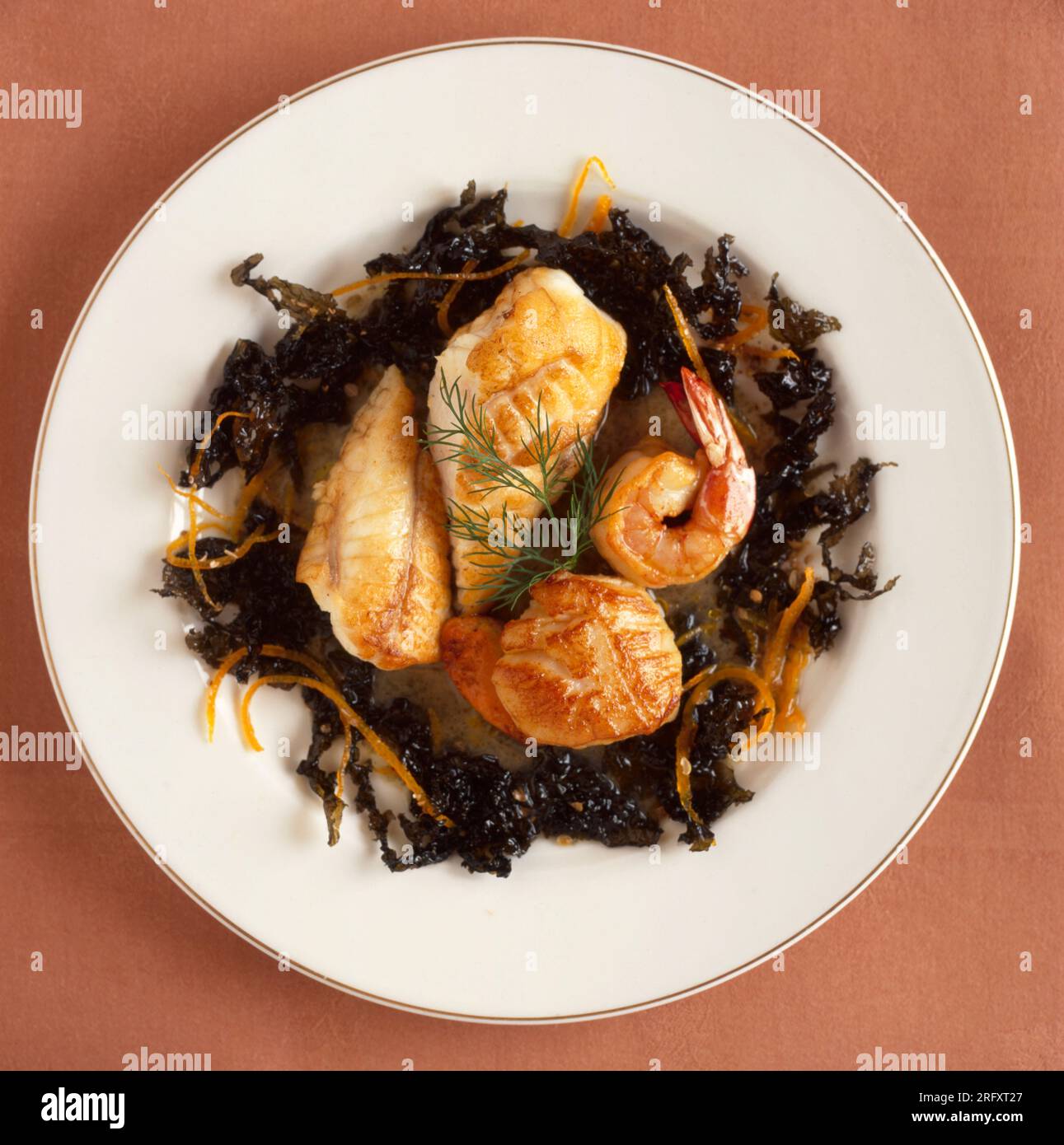 Roast monkfish with laverbread sauce Stock Photo - Alamy
