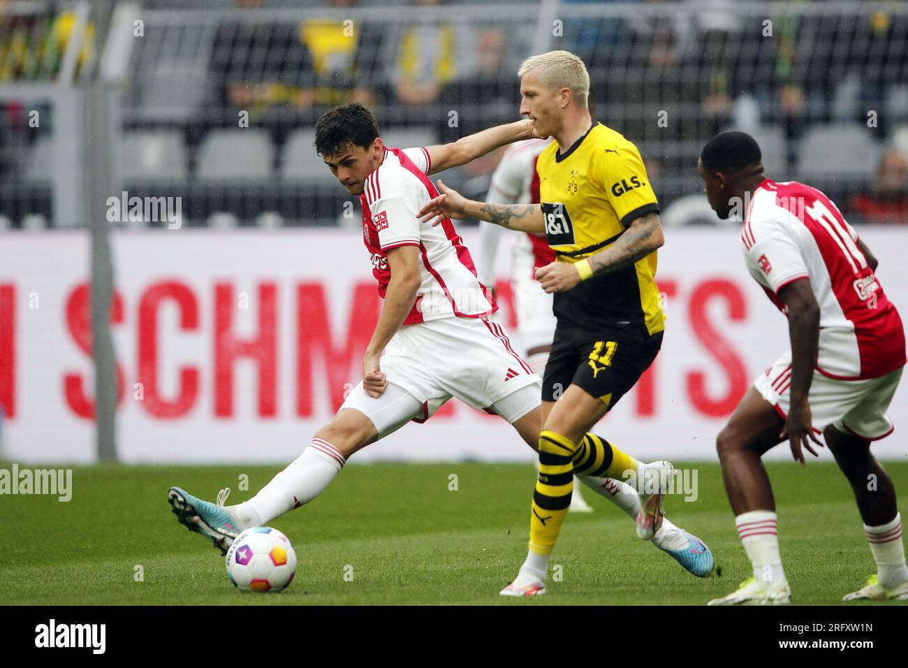 DORTMUND - (lr) Benjamin Tahirovic of Ajax, Marco Reus of Borussia ...