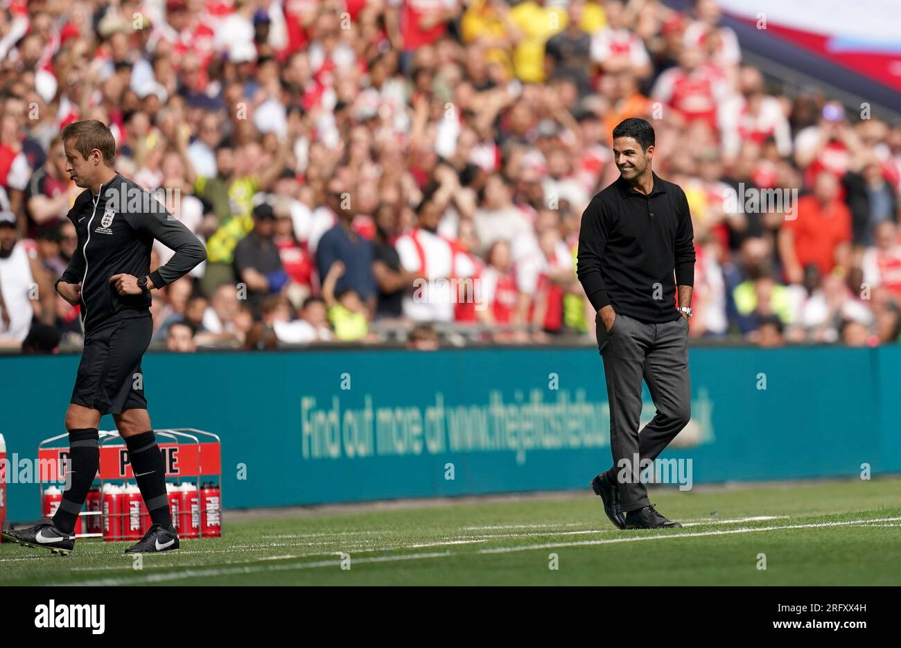 Arsenal manager Mikel Arteta and fourth official John Brooks on the ...