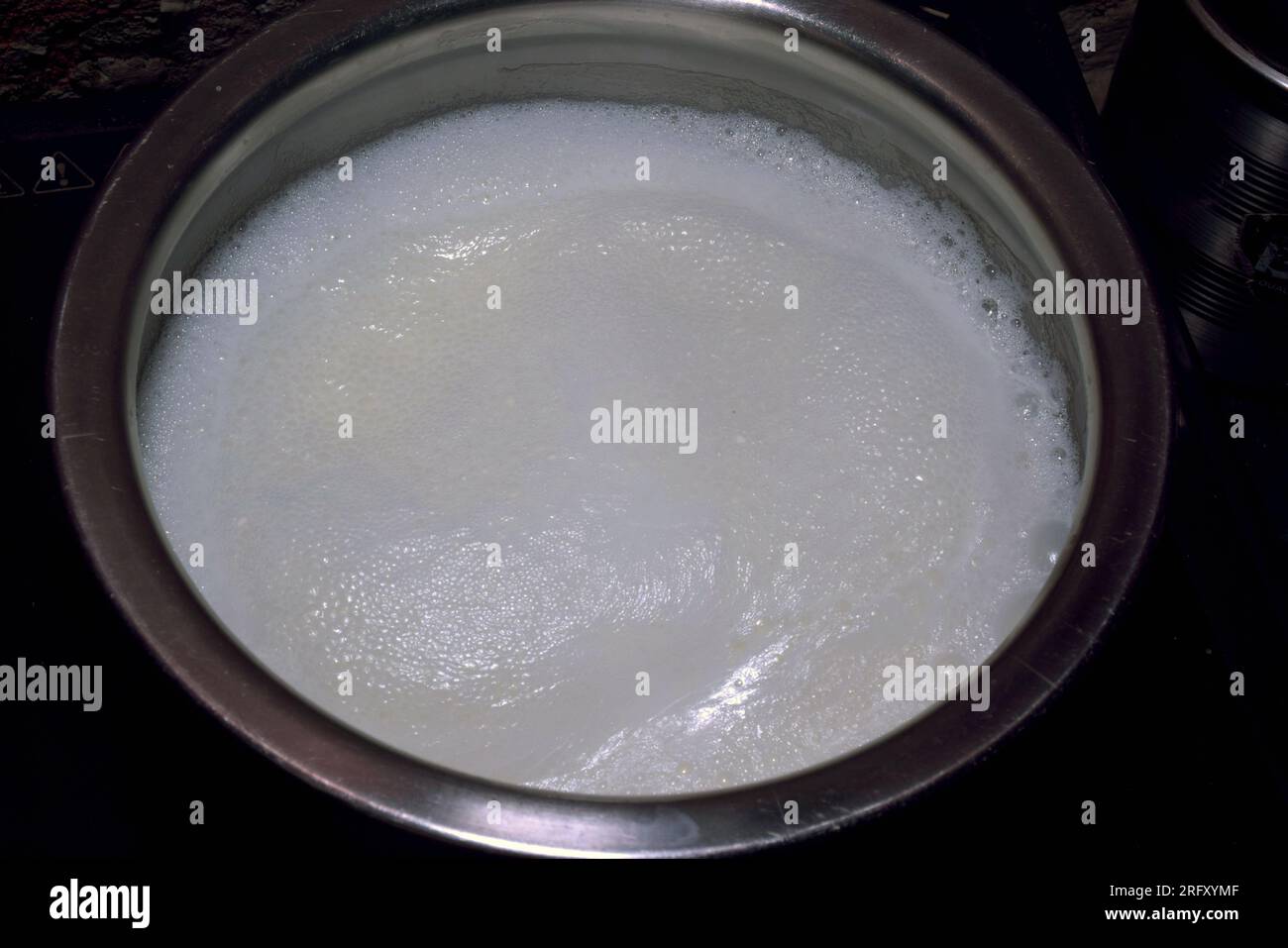 Boiling milk hi-res stock photography and images - Alamy