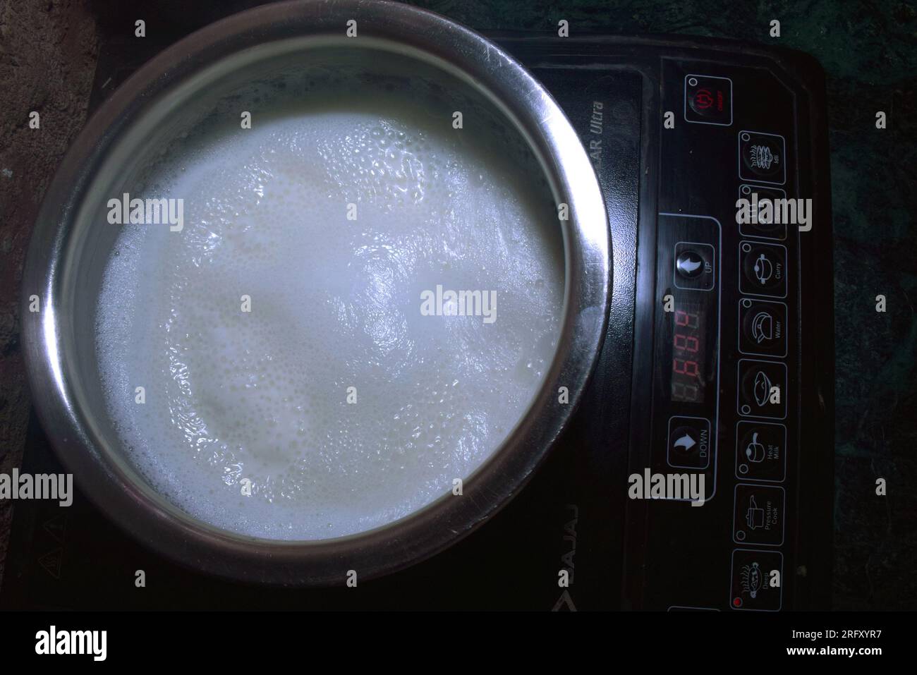 Boiling milk hi-res stock photography and images - Alamy