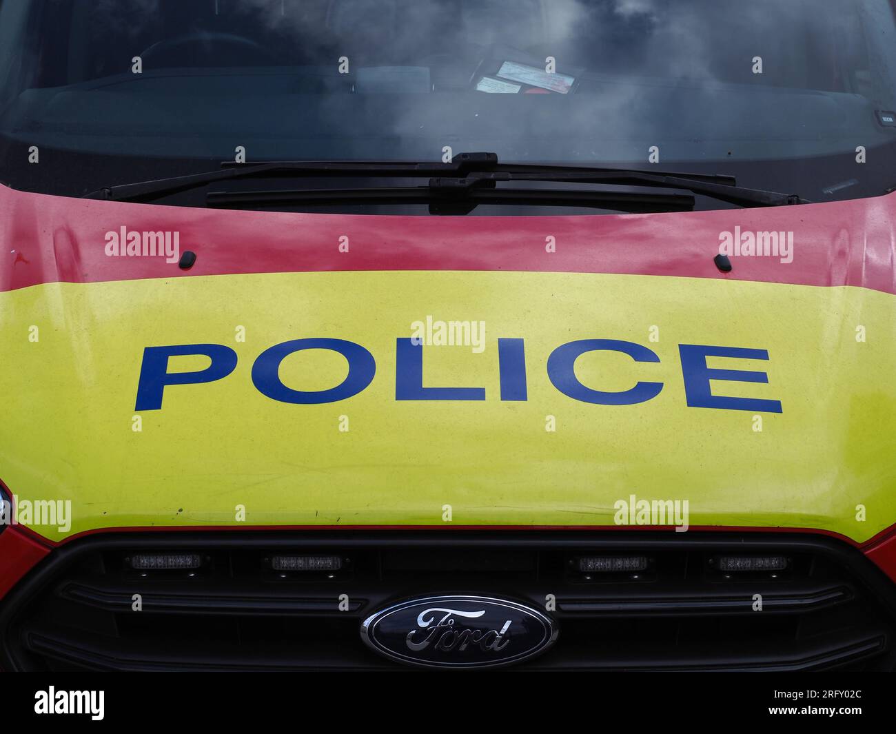 police sign on a Ford police van Stock Photo - Alamy