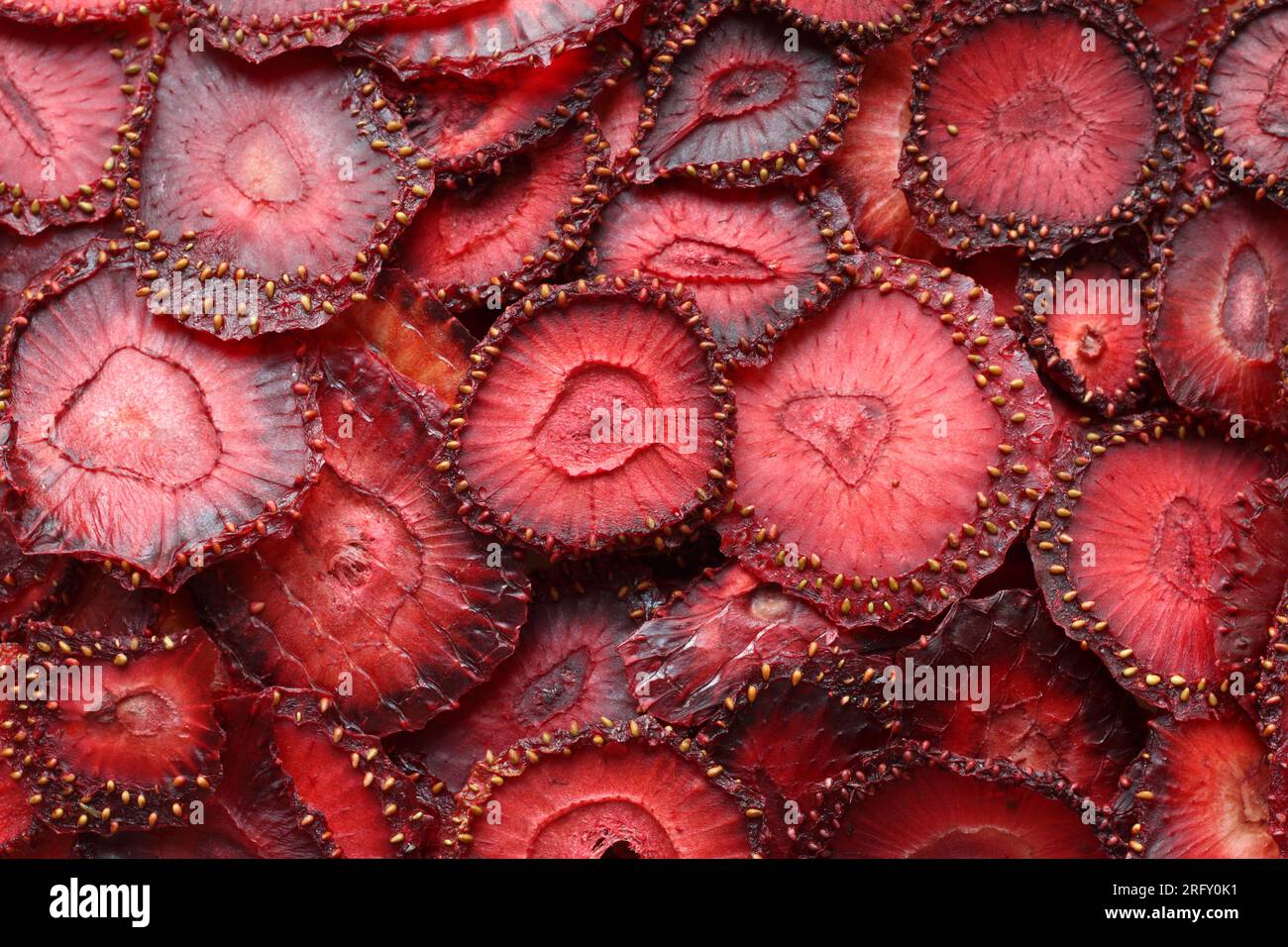 Dried strawberry pieces arranged randomly. View from above Stock Photo ...