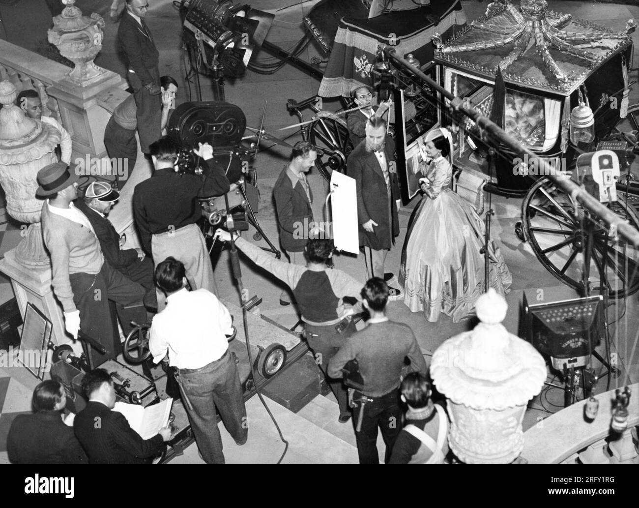 BRIAN AHERNE as Emperor Maximilian von Habsburg and BETTE DAVIS as ...