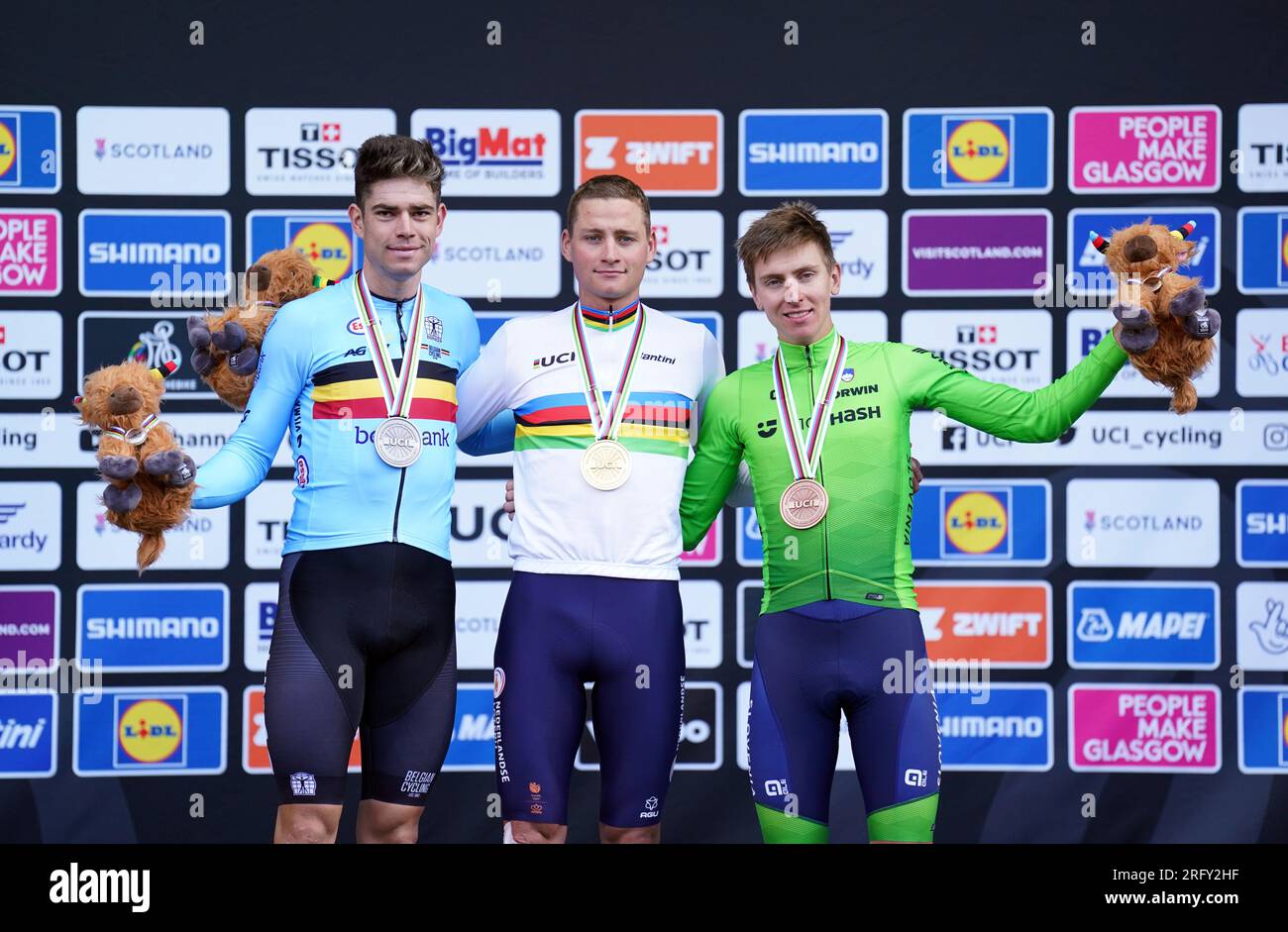 Left to right, silver medalist Wout van Aert, gold medalist Mathieu van der Poel and bronze ...
