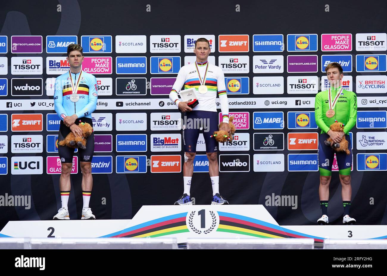 Left to right, silver medalist Wout van Aert, gold medalist Mathieu van der Poel and bronze ...