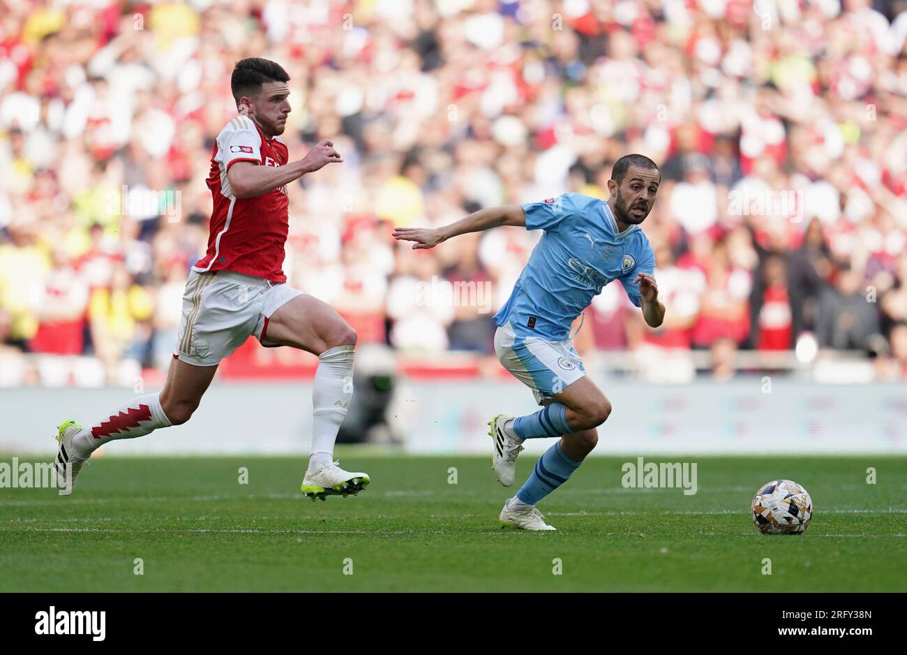 Arsenal's Declan Rice chases down Manchester City's Bernardo Silva ...