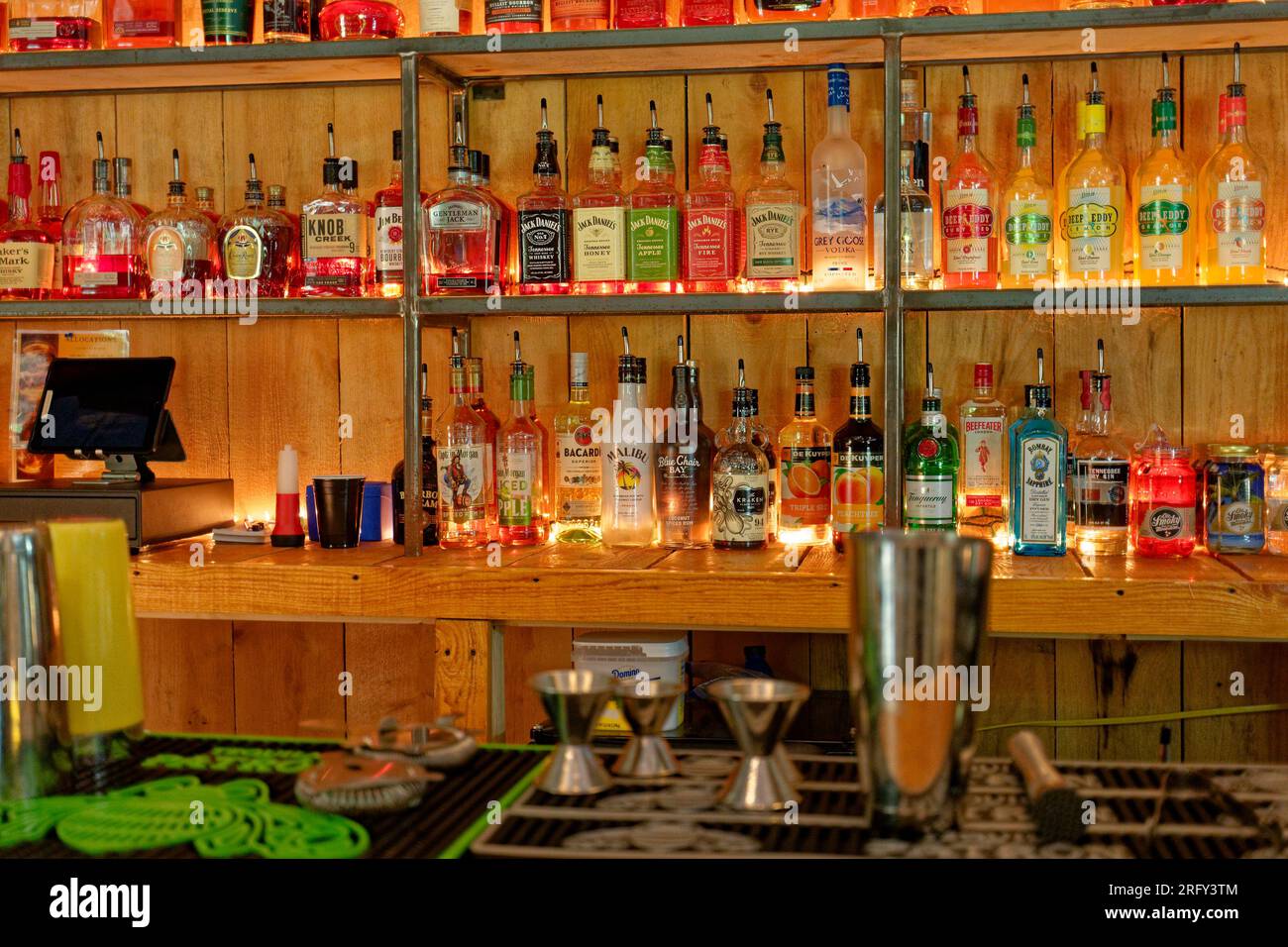 Alcohol bottles backlit display hi-res stock photography and images - Alamy