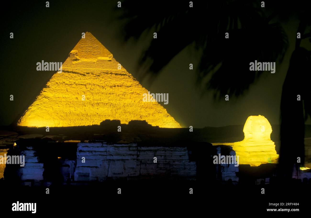 The pyramids of giza at a light show near the city of Cairo at the ...