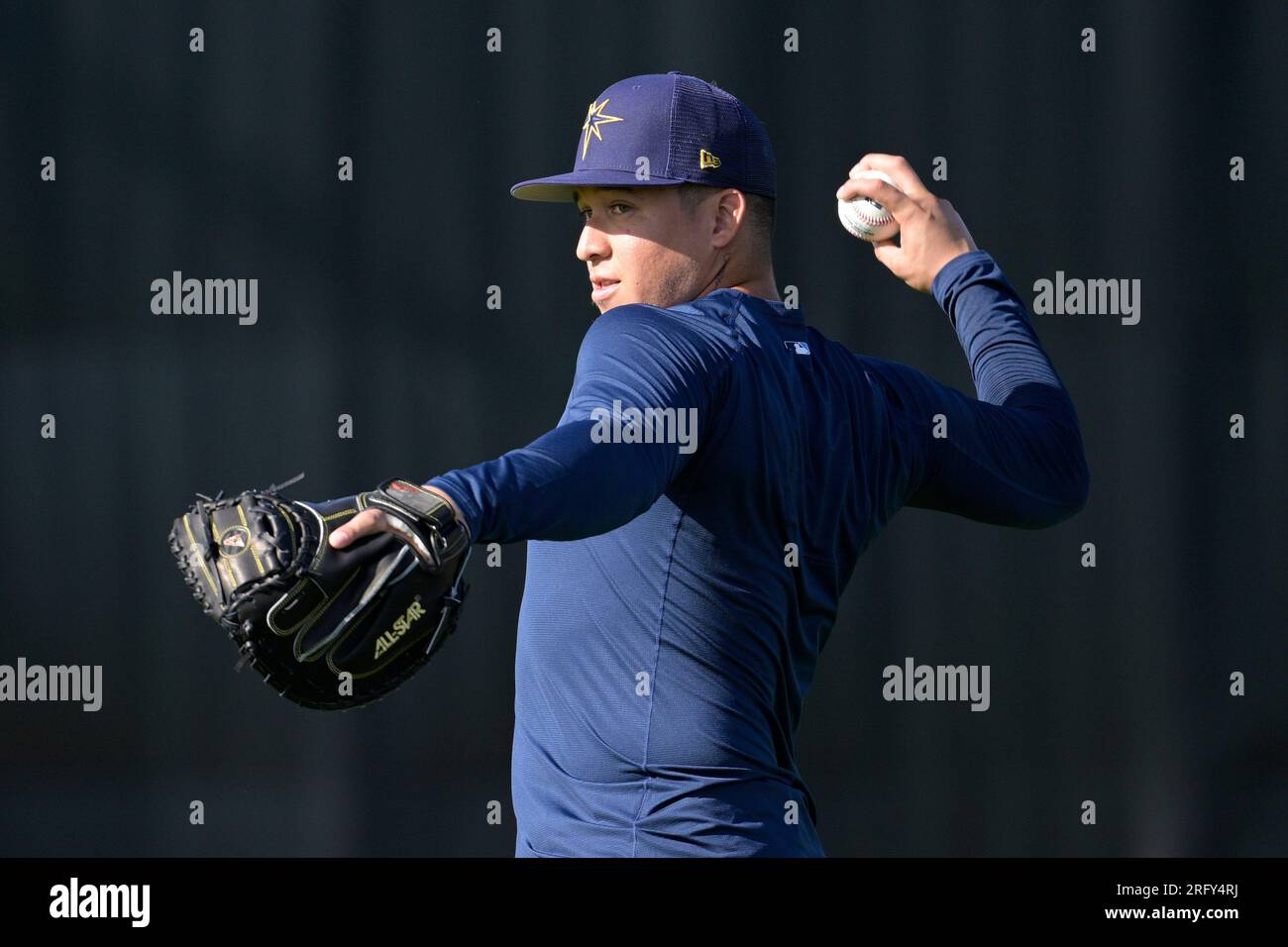 Tampa Bay Rays catcher Roberto Alvarez warms up during practice at ...