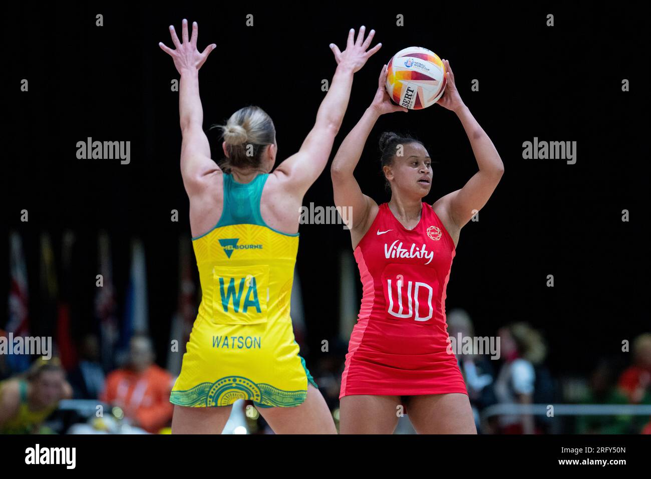 England's Laura Malcolm (right) and Australia's Liz Watson during the 2023 Netball World Cup ...