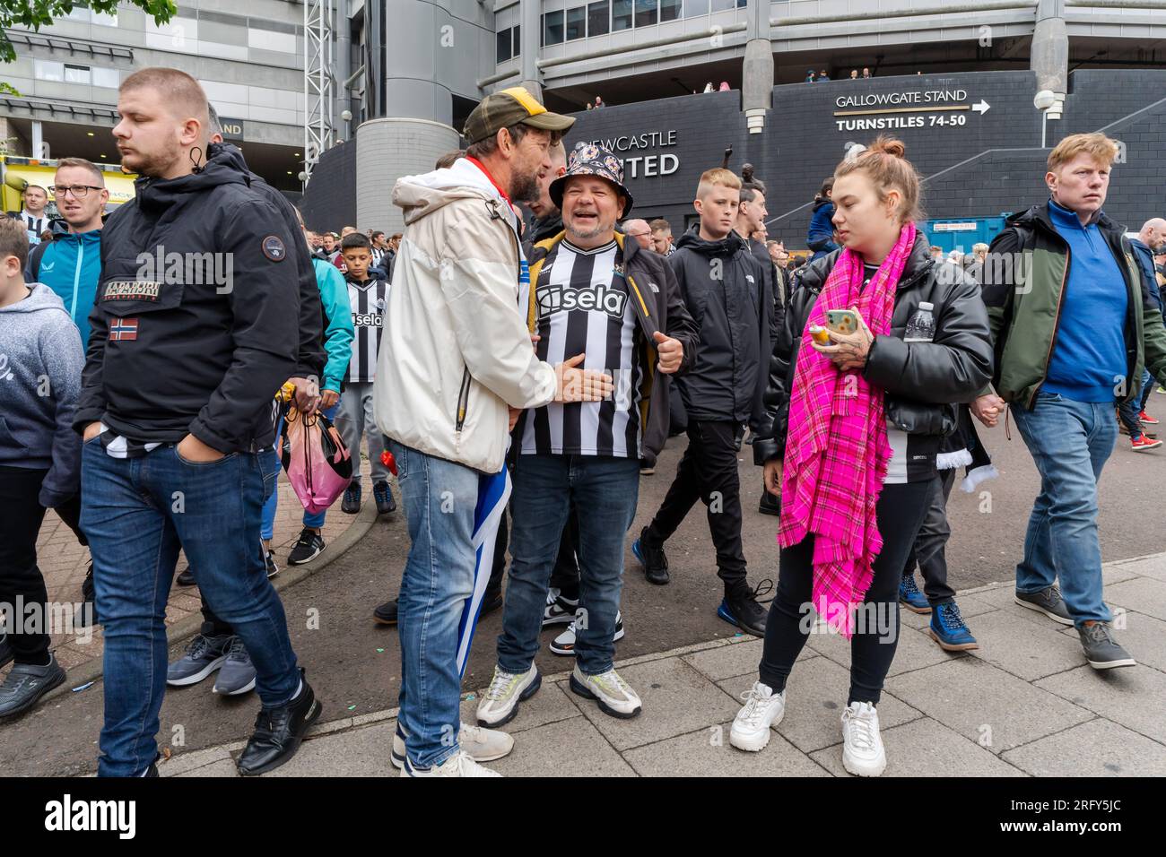 Football supporters outside St James Park stadium, home ground of ...